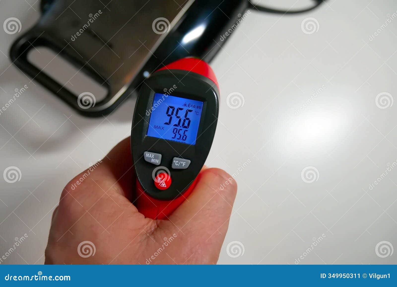 A Pyrometer for Measuring Temperature. Photo of the Temperature on the ...