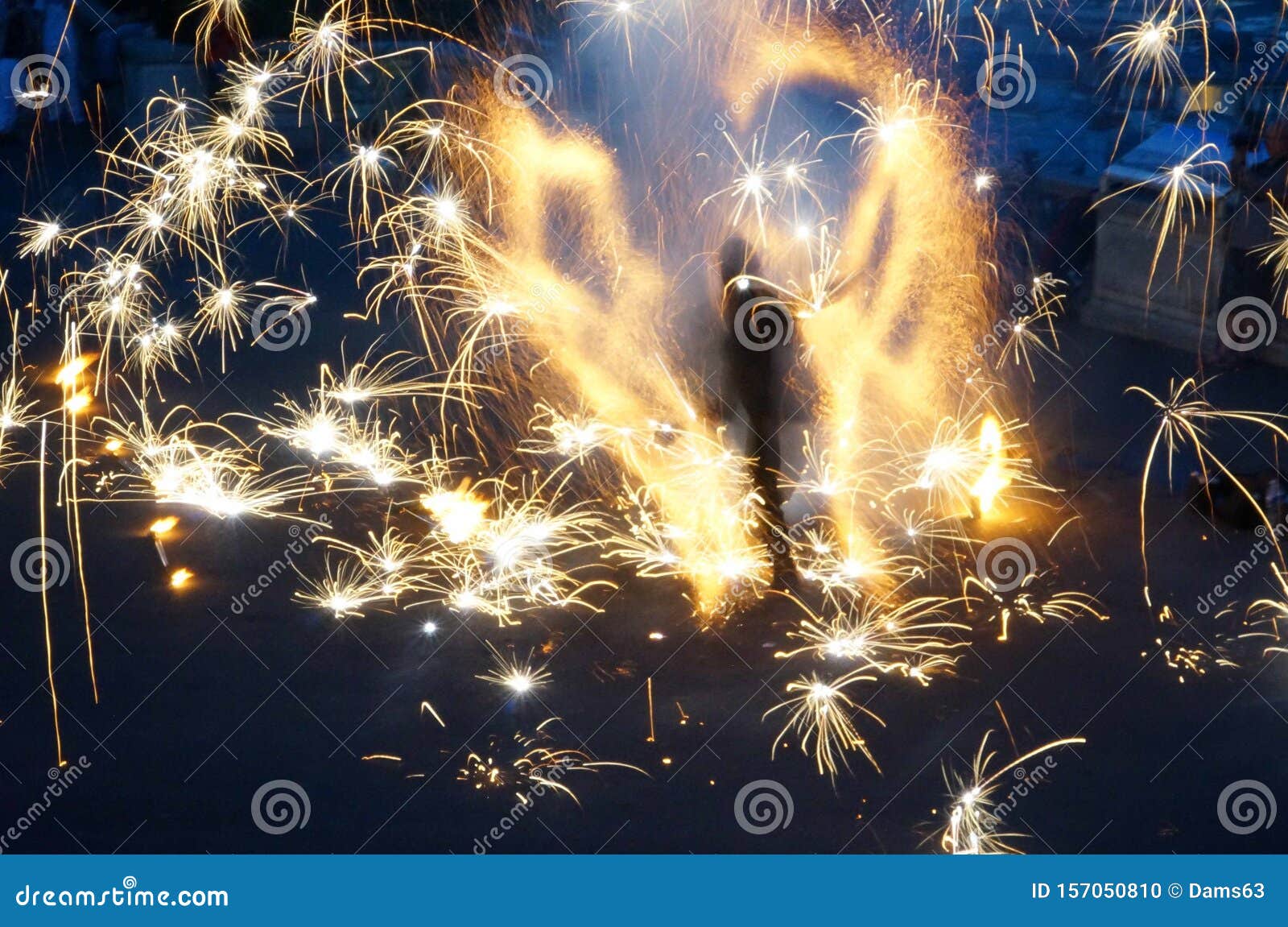 Pyrotechnic Effect in Slowmotion of a Flame Juggler Stock Photo - Image ...
