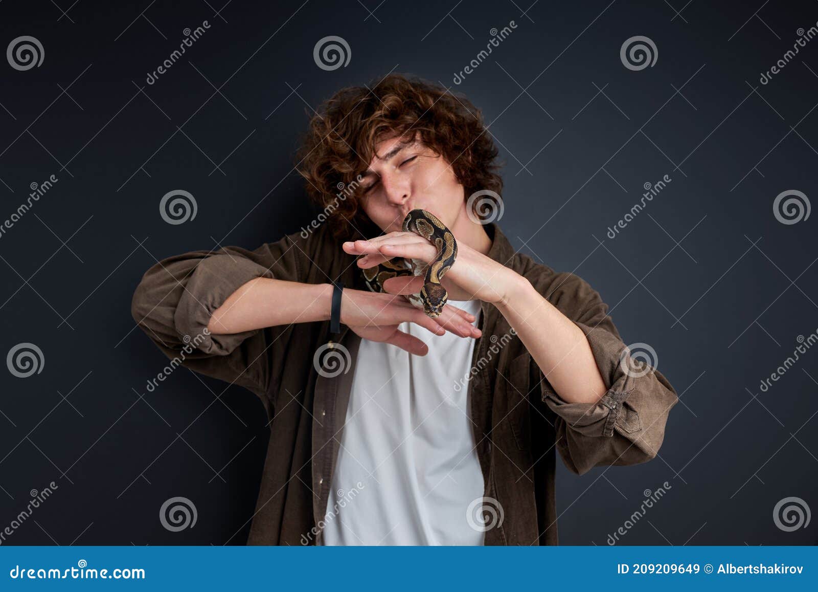 Python Snake Coiling Around Mans Hand Stock Image - Image of snake ...