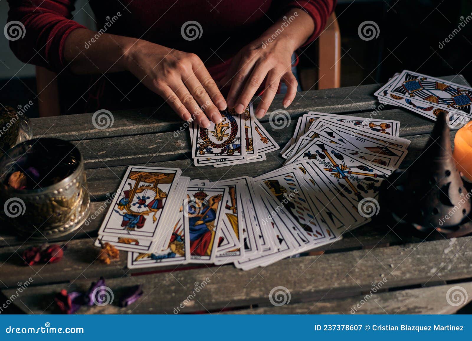 Pythoness Woman Reading Tarot Cards on a Wooden Table Stock Image ...