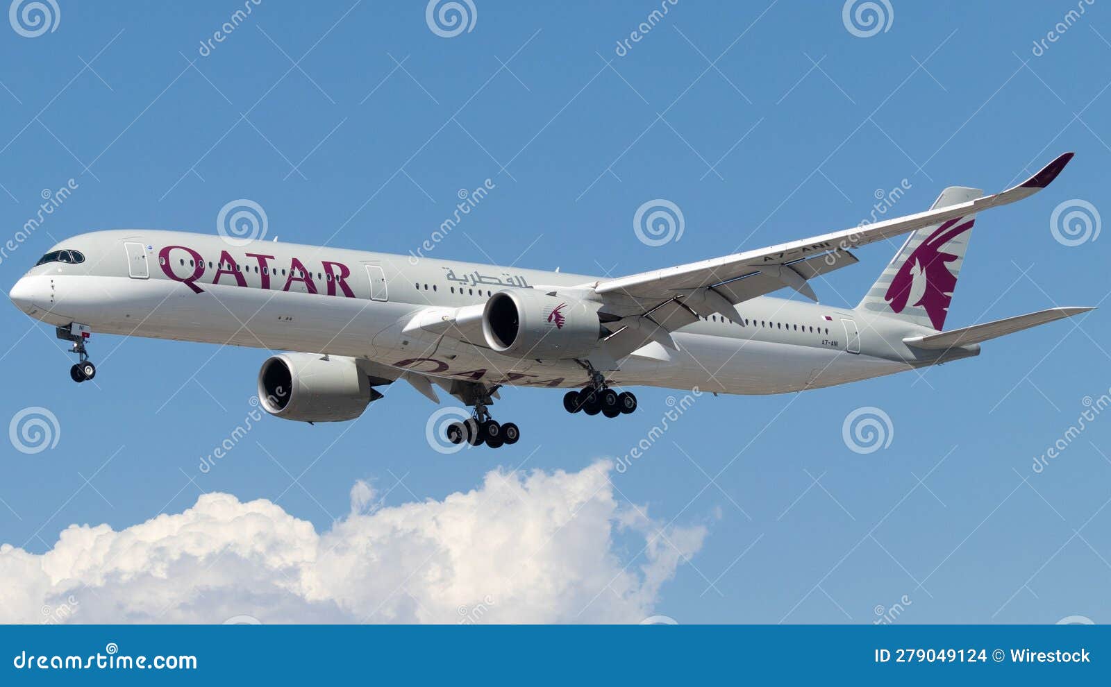 Qatar Airlines Aircraft Soaring Against a Blue Sky Backdrop. Editorial ...