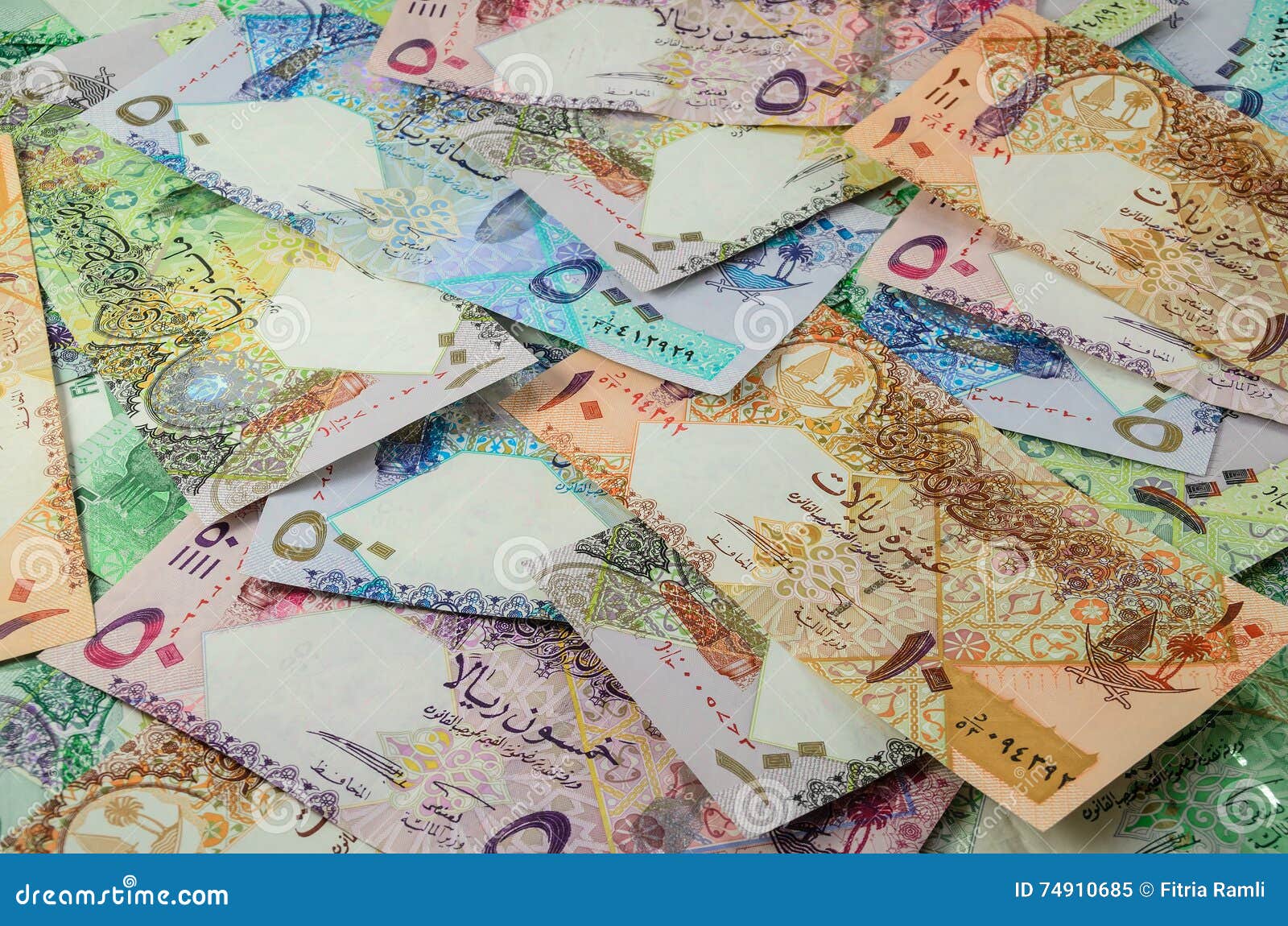 Qatar currency stock image. Image of coins, banknotes - 74910685
