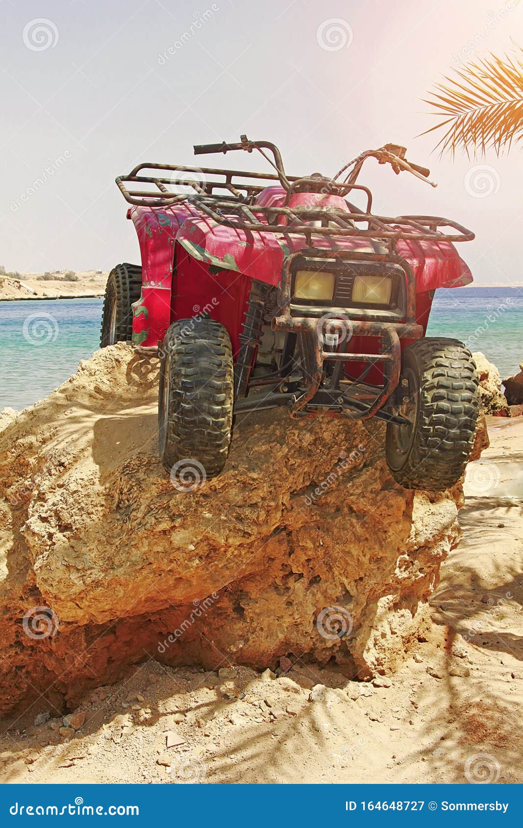 Quad Bike ATVs on Rock on Beach of Sea Stock Image - Image of quad ...