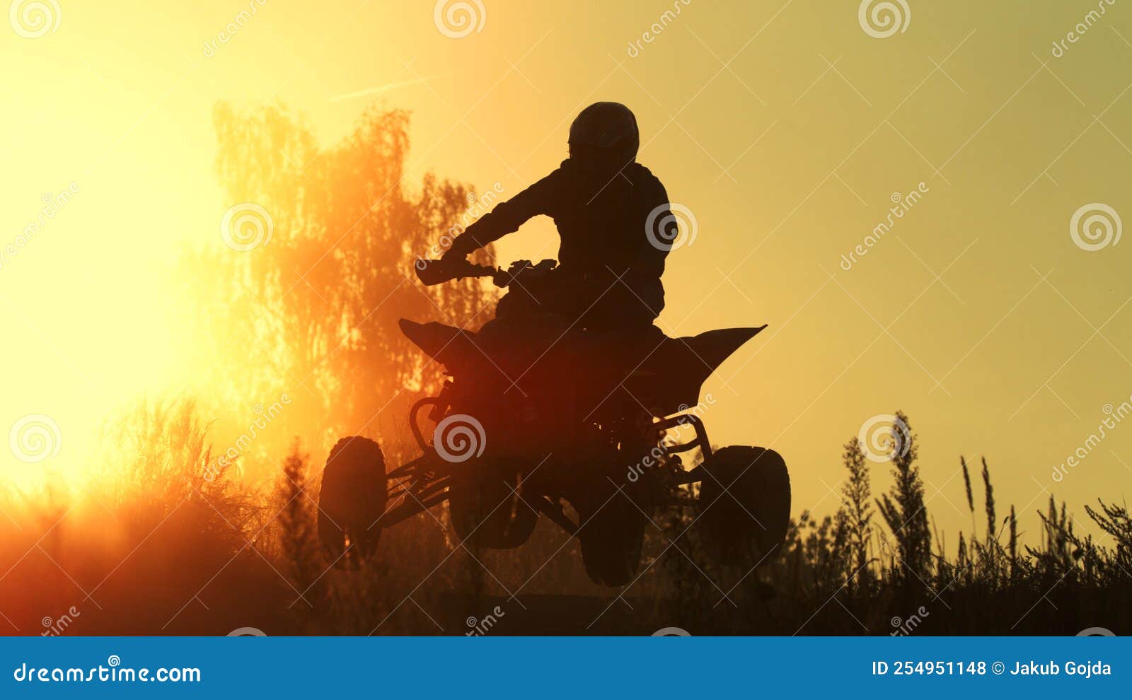 Quad Biker Jumping in Sunset Stock Photo - Image of sport, height ...