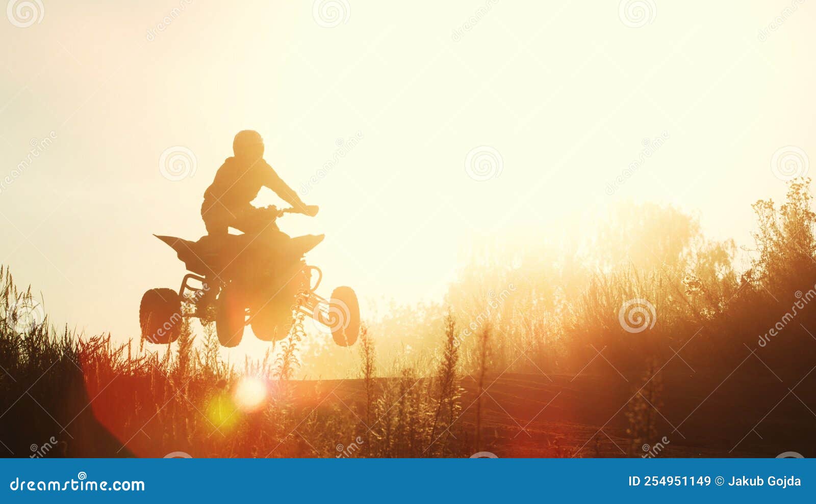 Quad Biker Jumping in Sunset Stock Image - Image of motocross, engine ...
