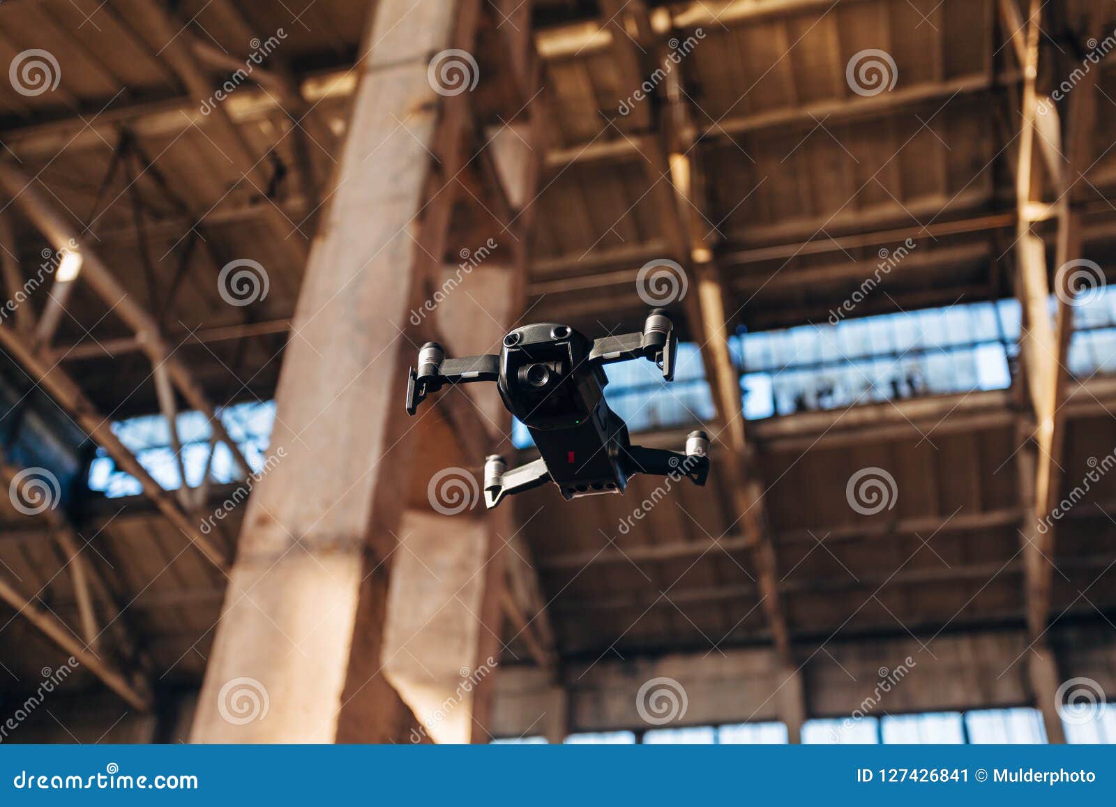 Quad-copter Drone with Camera Flying Inside Industrial Building Stock ...