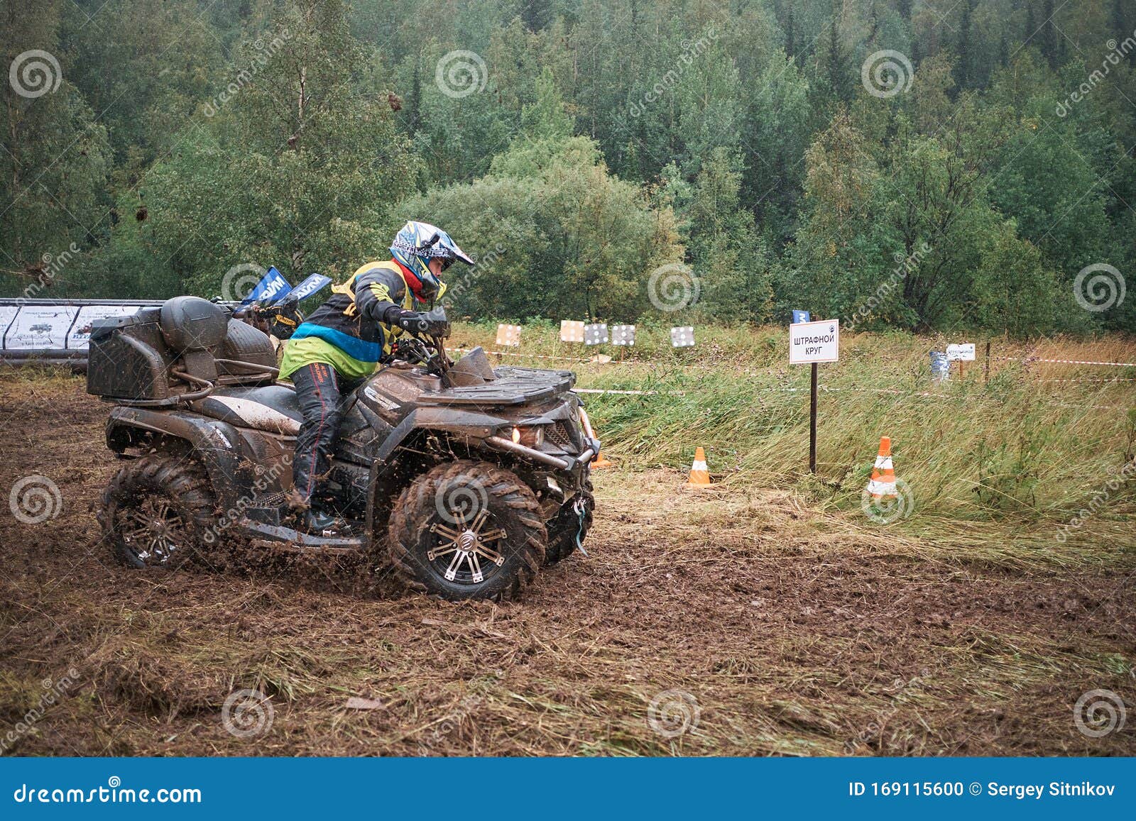 Quad Rider Jumping on a Muddy Forest Trail Editorial Image - Image of ...
