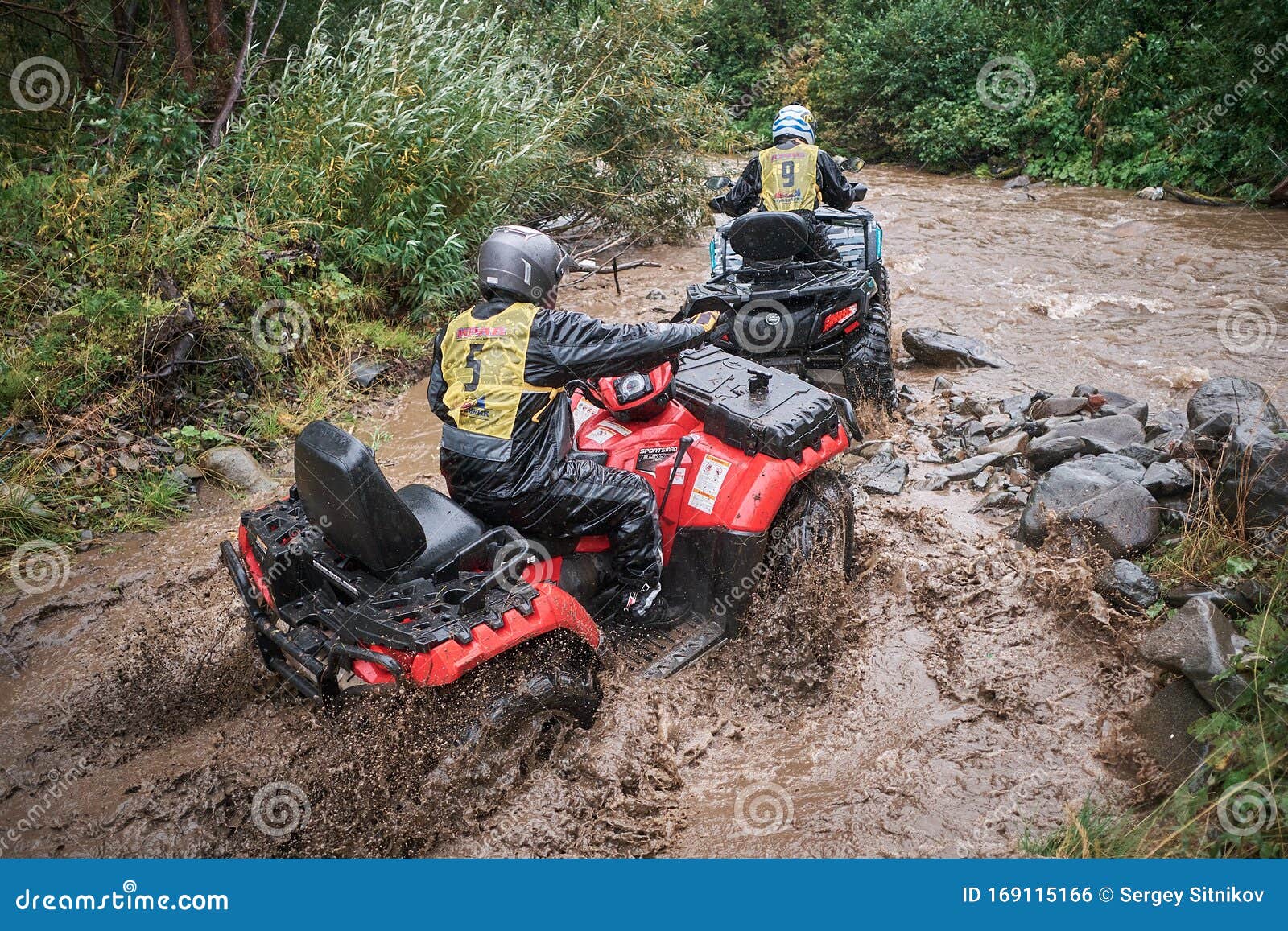 Quad Rider Jumping on a Muddy Forest Trail Editorial Photo - Image of ...