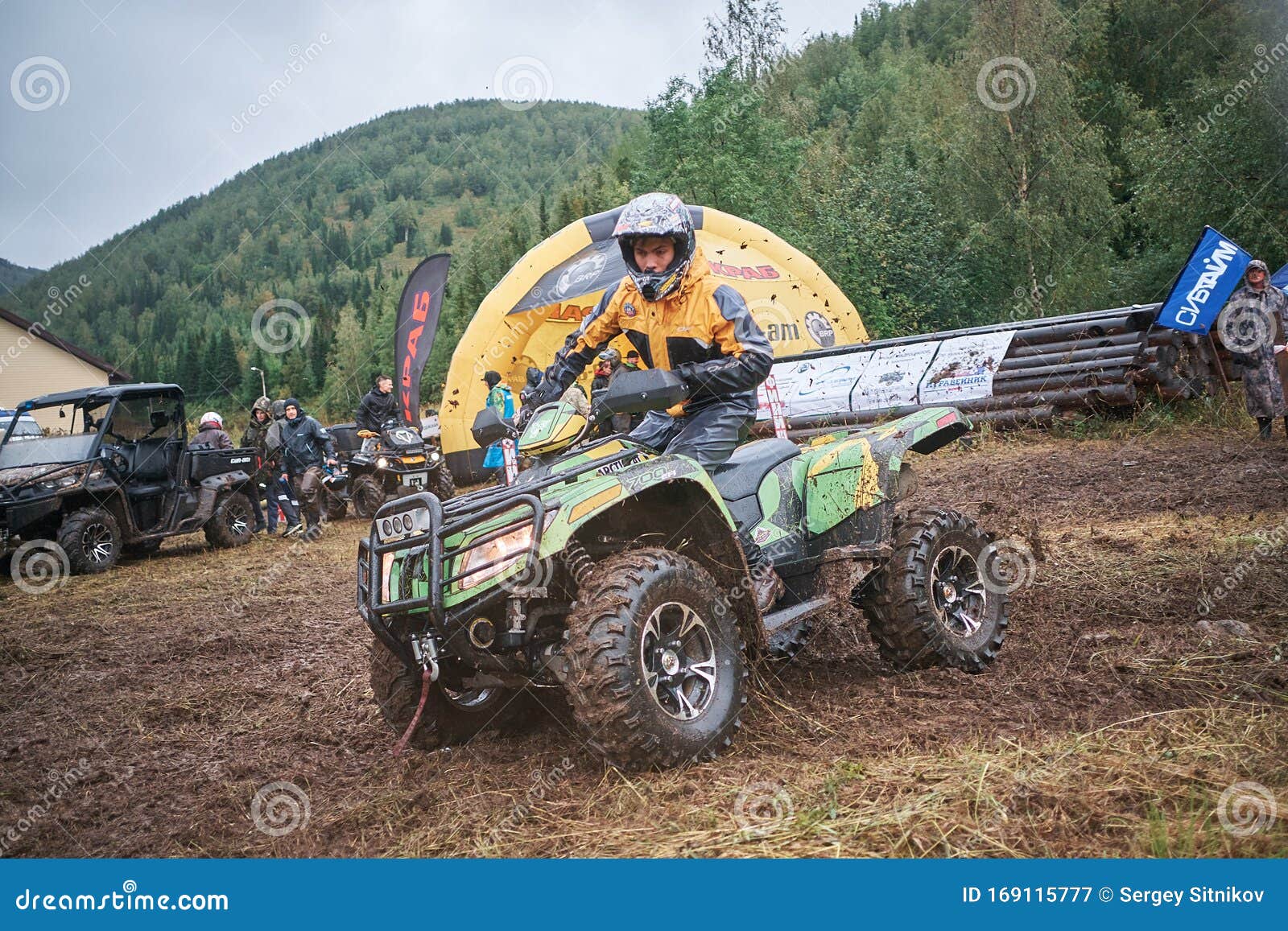 Quad Rider Jumping on a Muddy Forest Trail Editorial Photography ...