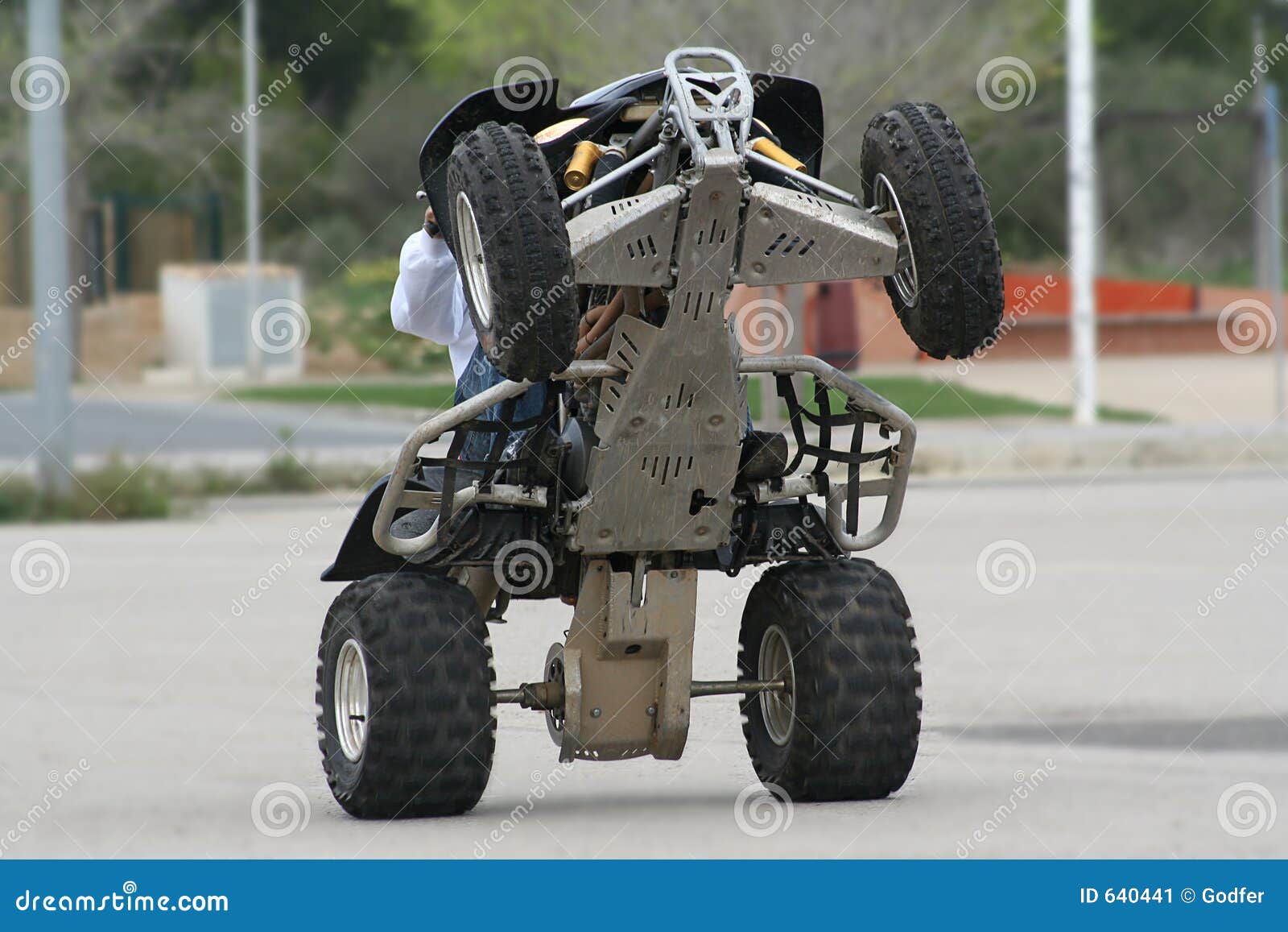 Quad wheelie stock image. Image of cross, four, play, people - 640441