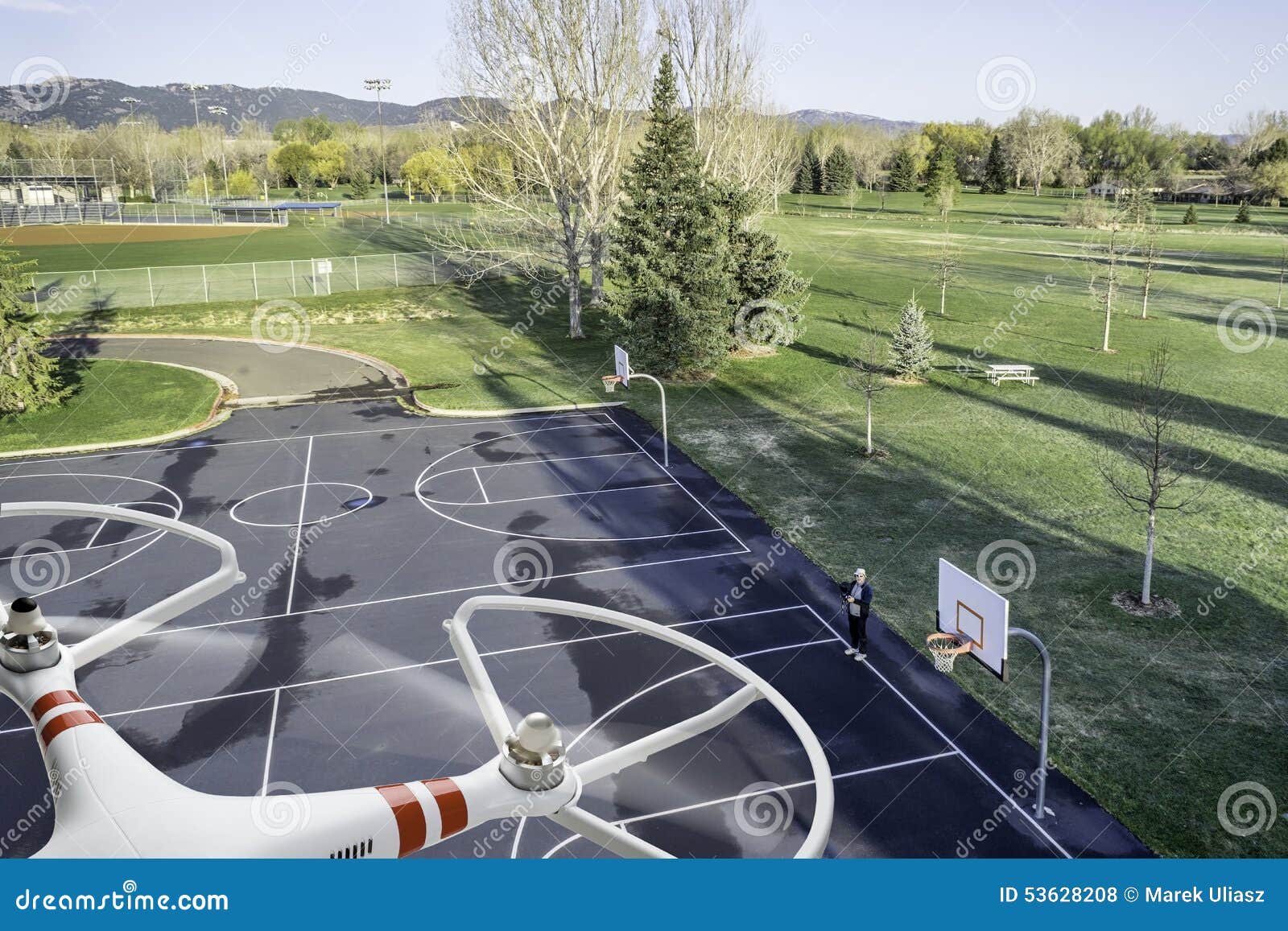 Quadcopter Drone Flying Over Basketball Court Stock Photo - Image of ...