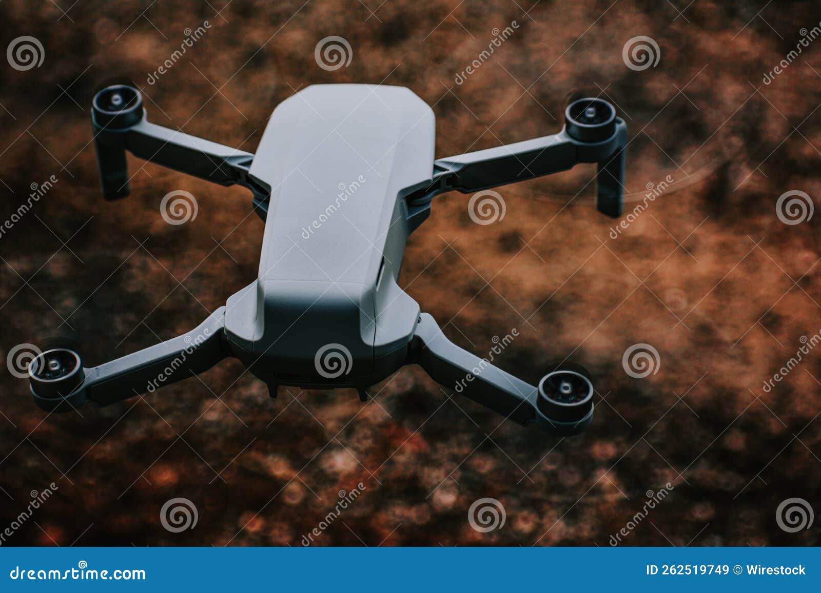 Quadcopter Flying Above the Ground Stock Image - Image of transport ...
