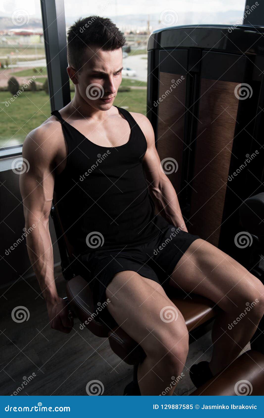 Quadriceps Exercises in Gym Stock Image - Image of caucasian, exercises ...