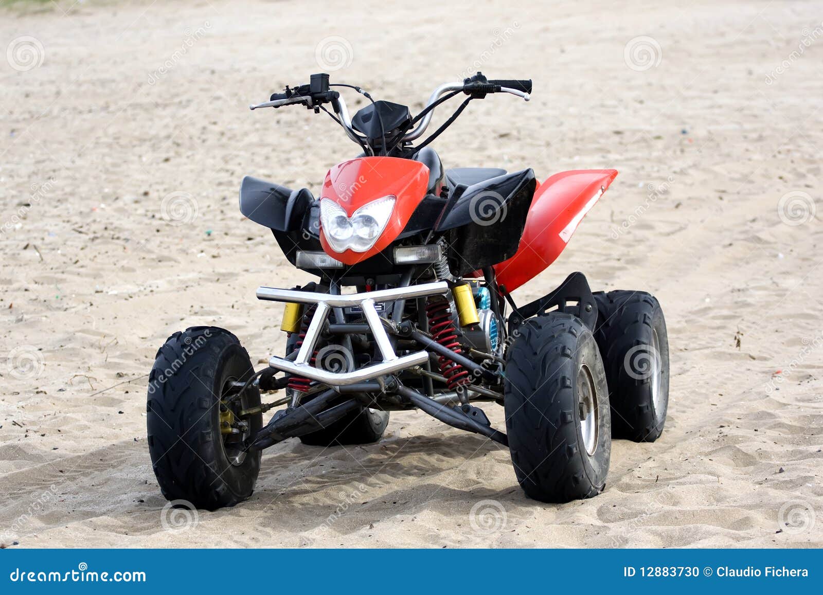 Quadricycle in the sand 2 stock photo. Image of beach - 12883730