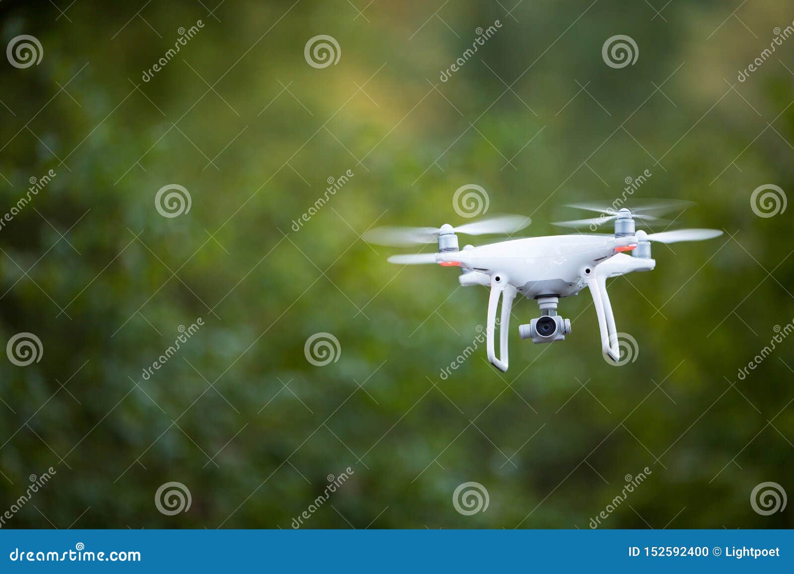 Quadrocopter Drone in Flight Stock Photo - Image of airplane, lens ...