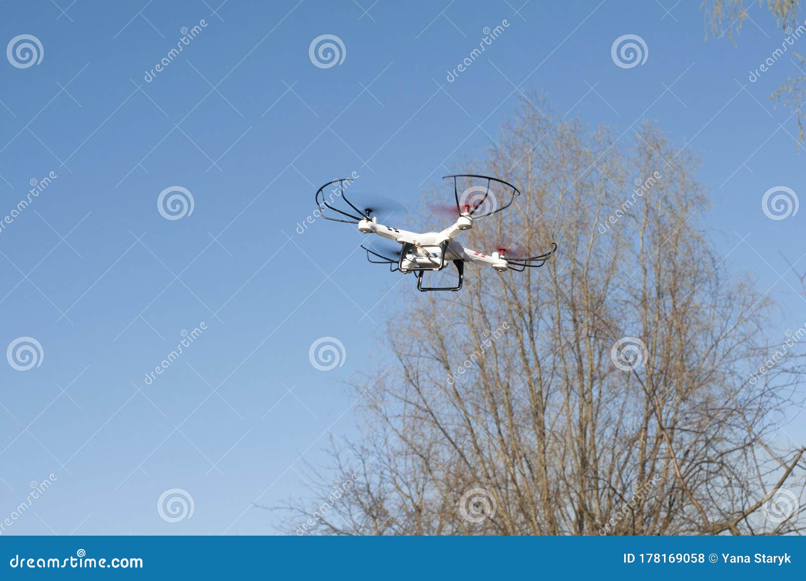 Quadrocopter Flying in the Sky Stock Photo - Image of drone, outdoor ...