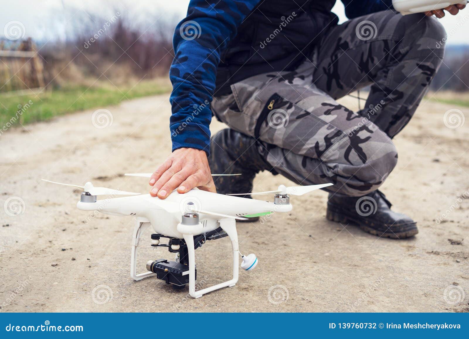 Quadrocopter in the Hands of Man Preparation for Flight Stock Photo ...