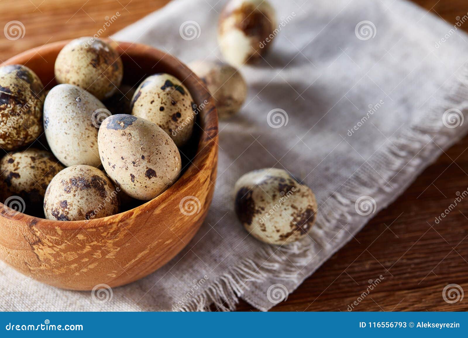 Quail Eggs in the Container Over Rustic Wooden Table, Close-up, High ...