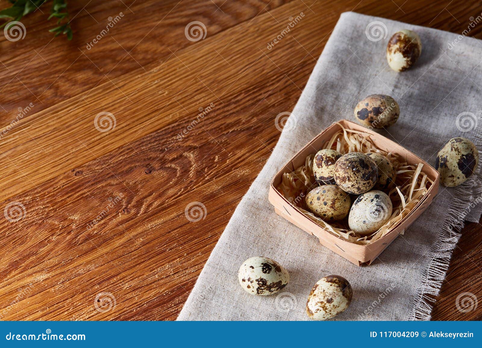 Quail Eggs in the Container Over Rustic Wooden Table, Close-up, High ...