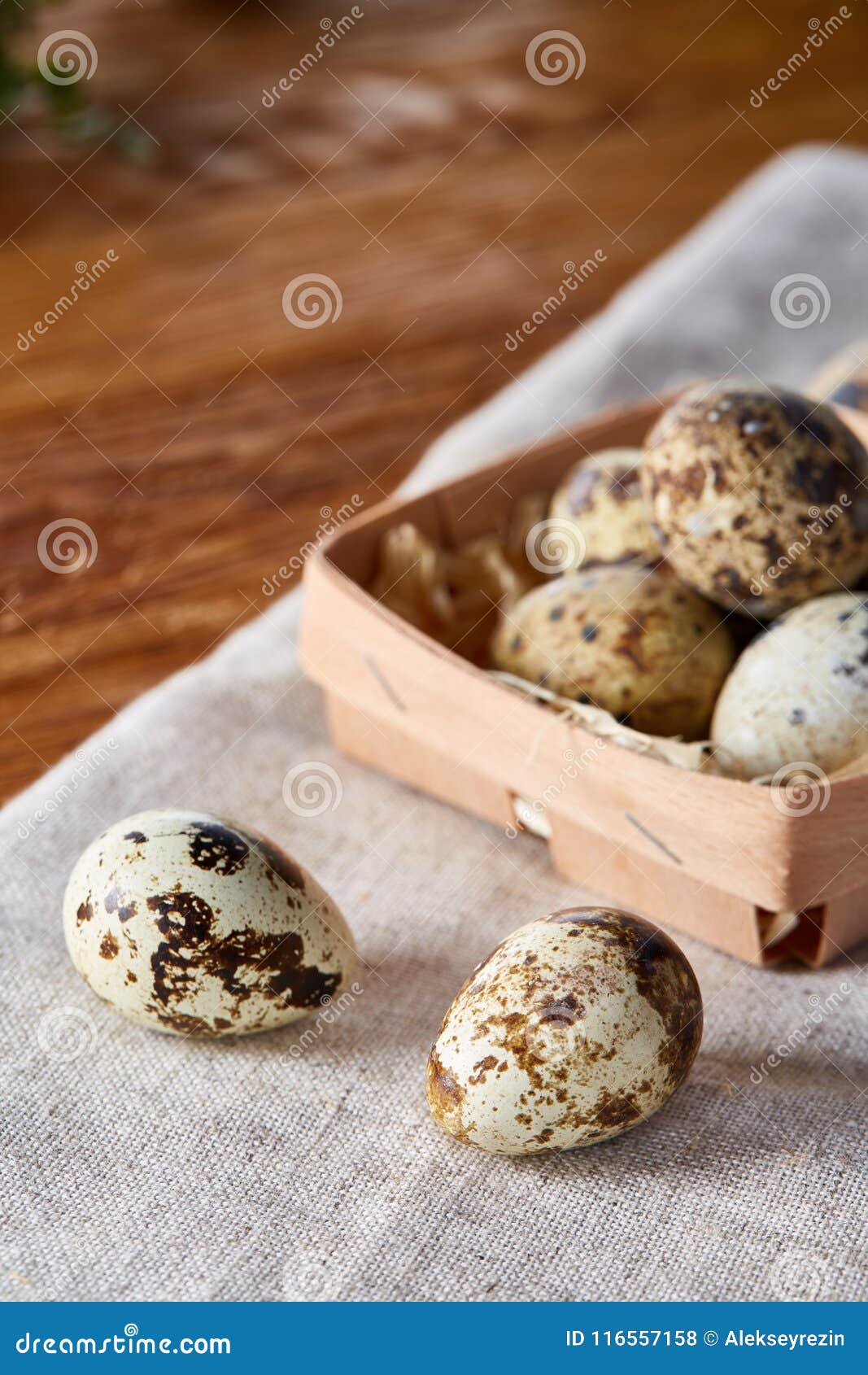 Quail Eggs in the Container Over Rustic Wooden Table, Close-up, High ...