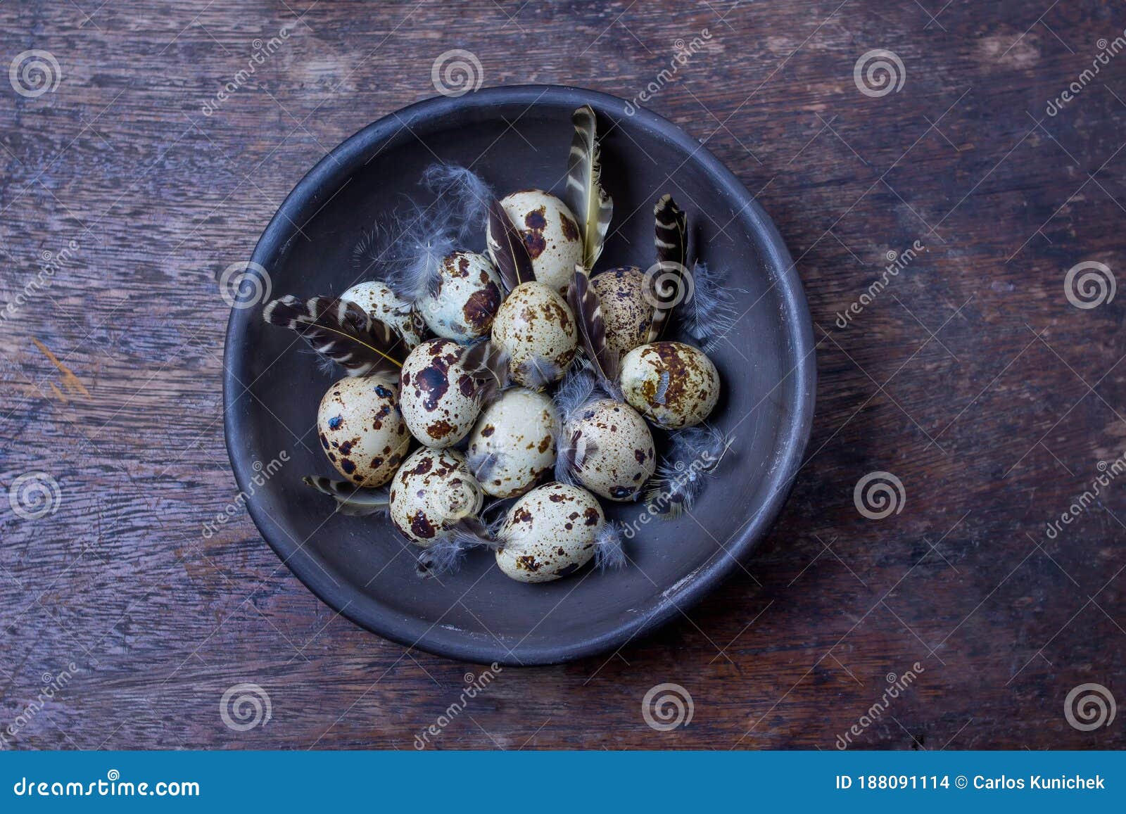 Quail Eggs in a Rustic Black Ceramic Dish Stock Photo - Image of easter ...