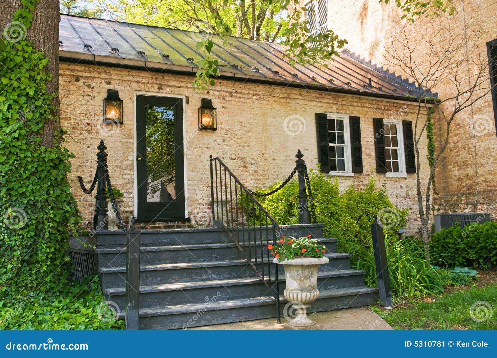 Quaint cabin in woods stock image. Image of front, doorway - 5310781