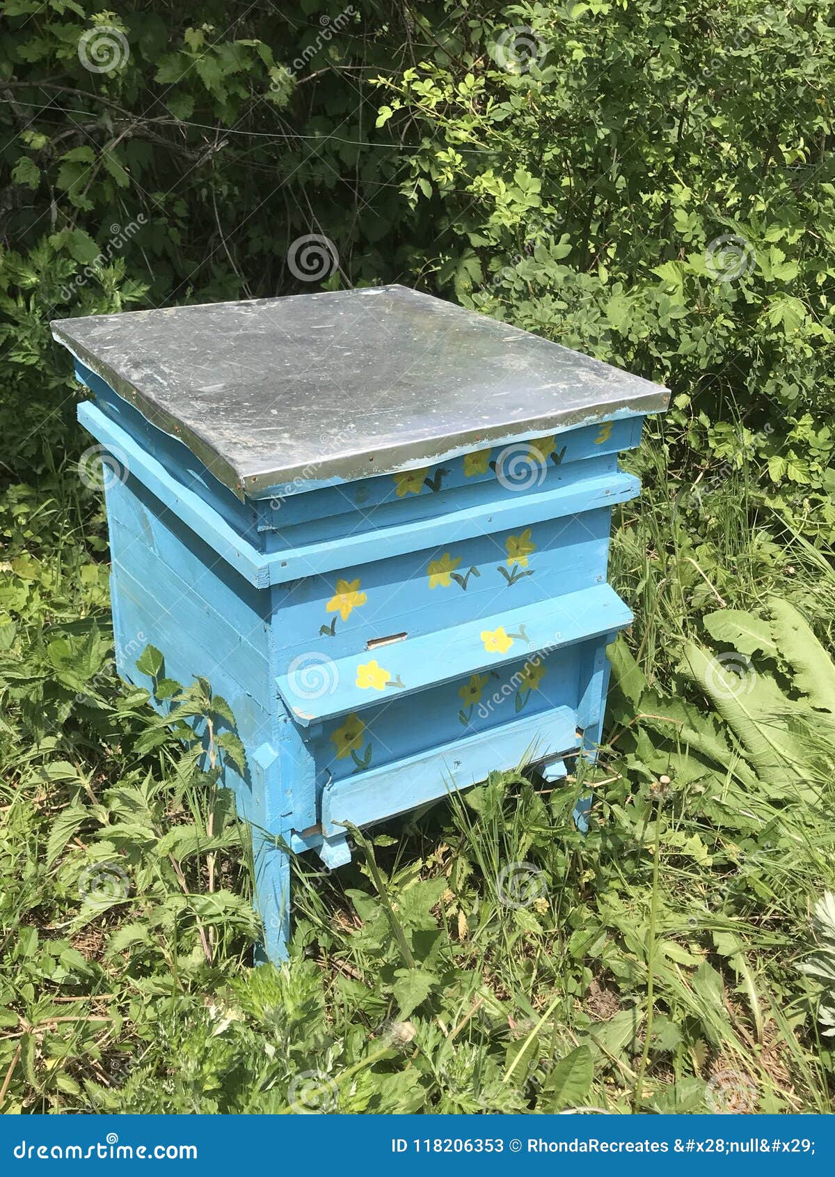 A Handmade Bee Hive Blue with Flowers Stock Image - Image of quaint ...