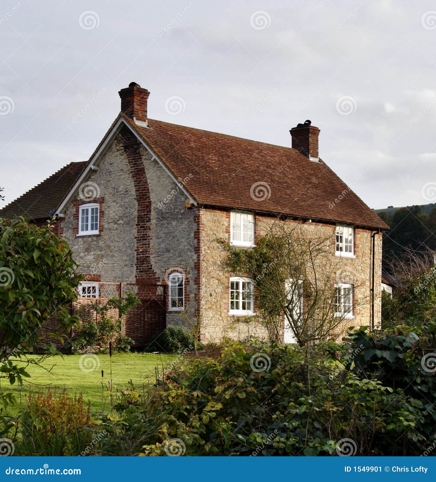 Quaint Rural Cottage stock image. Image of shrubs, windows - 1549901