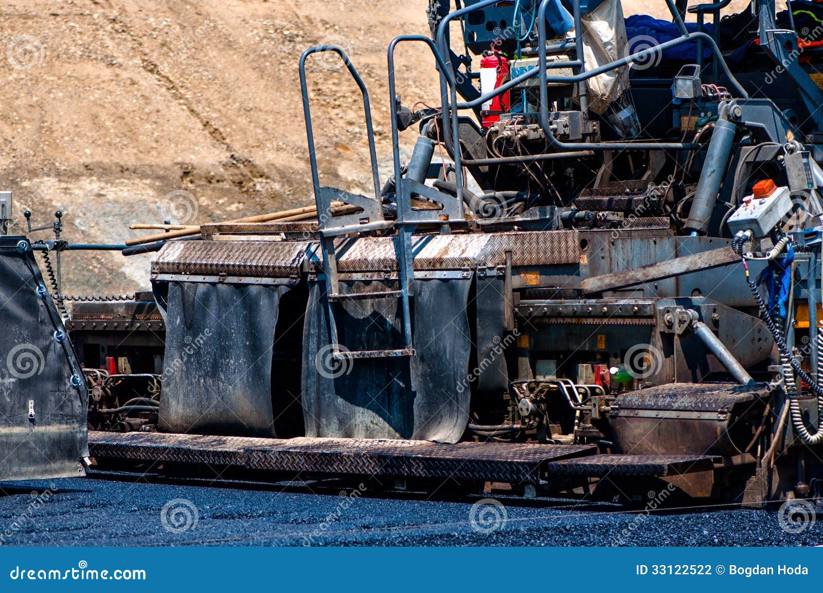 Qualified Engineer Operating Asphalt Paver Machine Stock Photo - Image ...