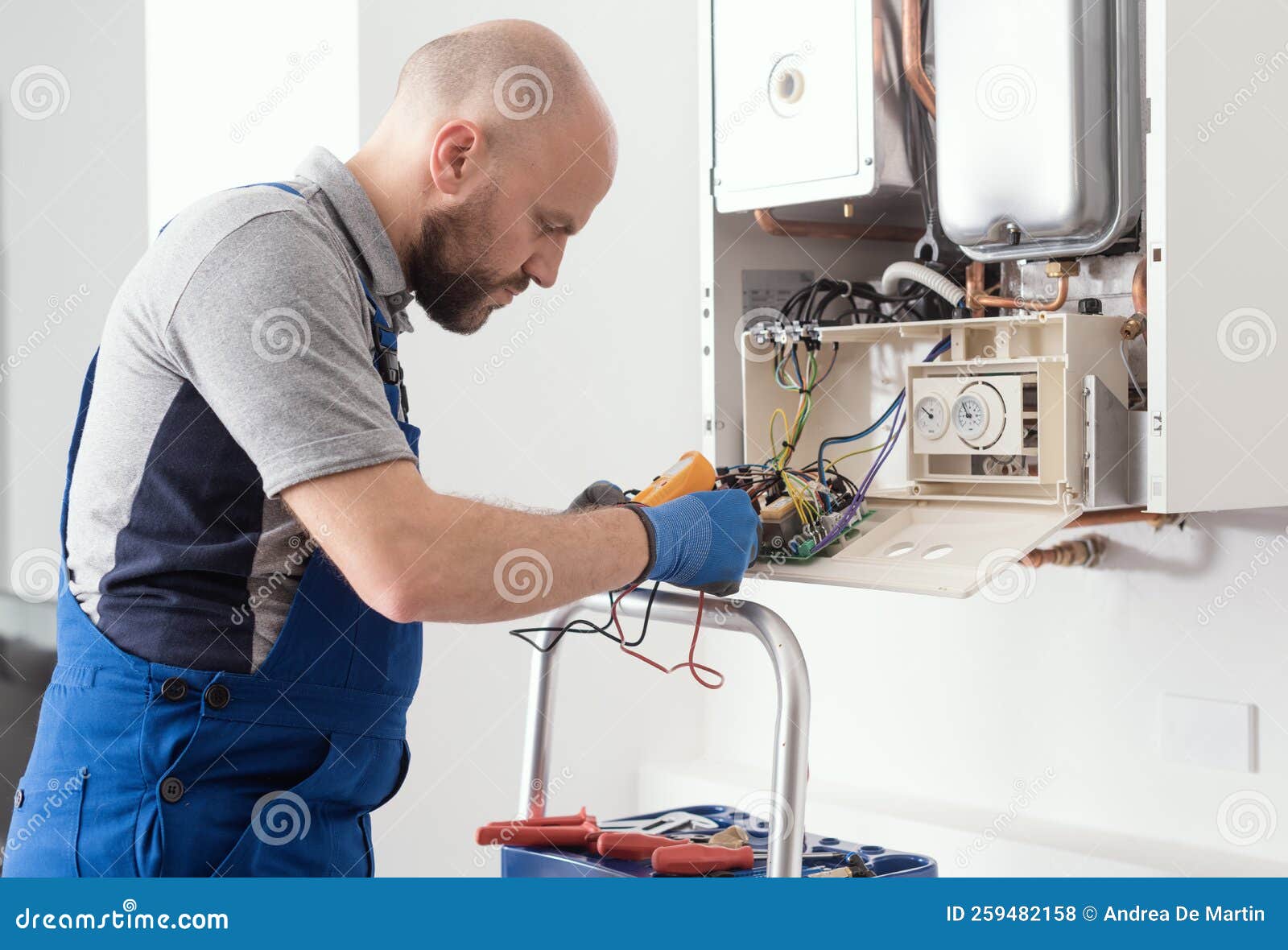Qualified Engineer Servicing a Boiler Stock Photo - Image of indoors ...