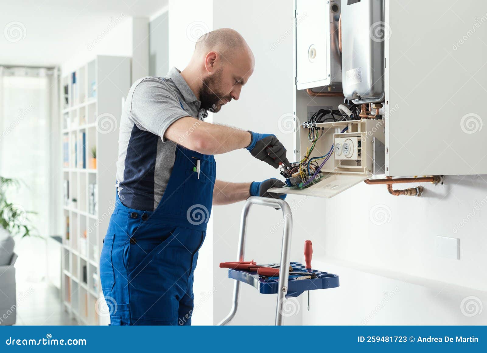 Qualified Engineer Servicing a Boiler Stock Image - Image of assistance ...