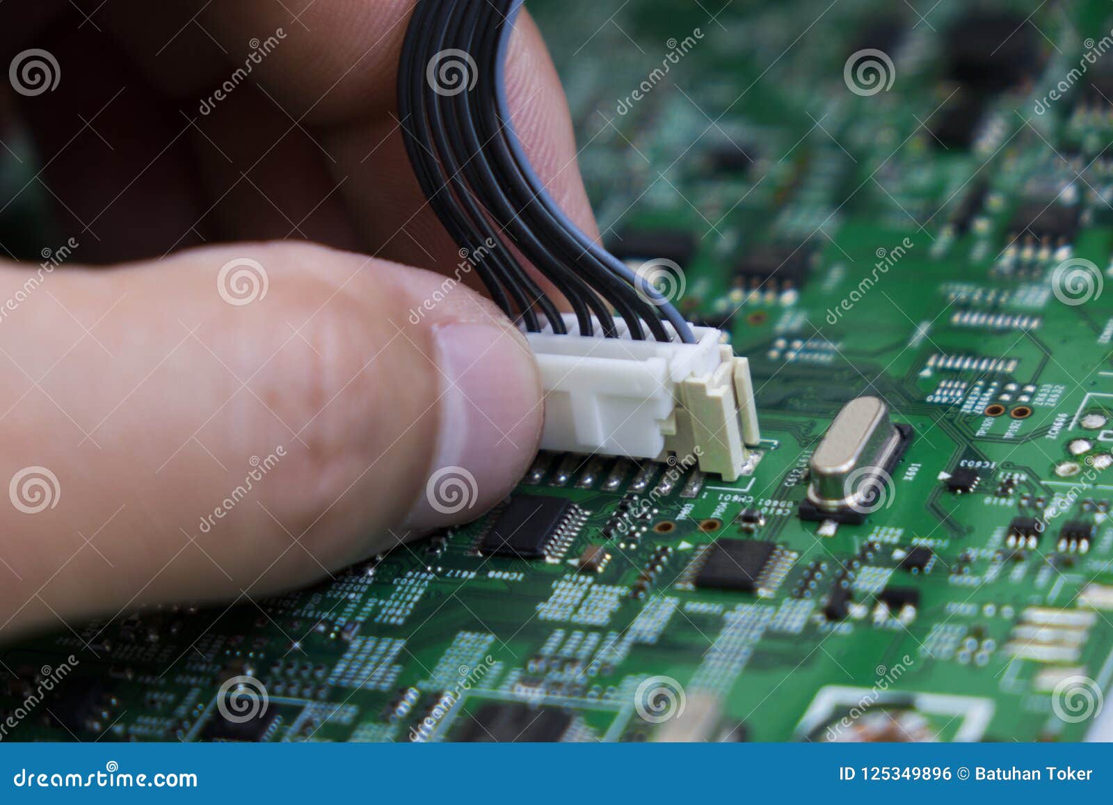 Components On PC Circuit Board. Chip, Fan, Capacitor And Connectors On ...