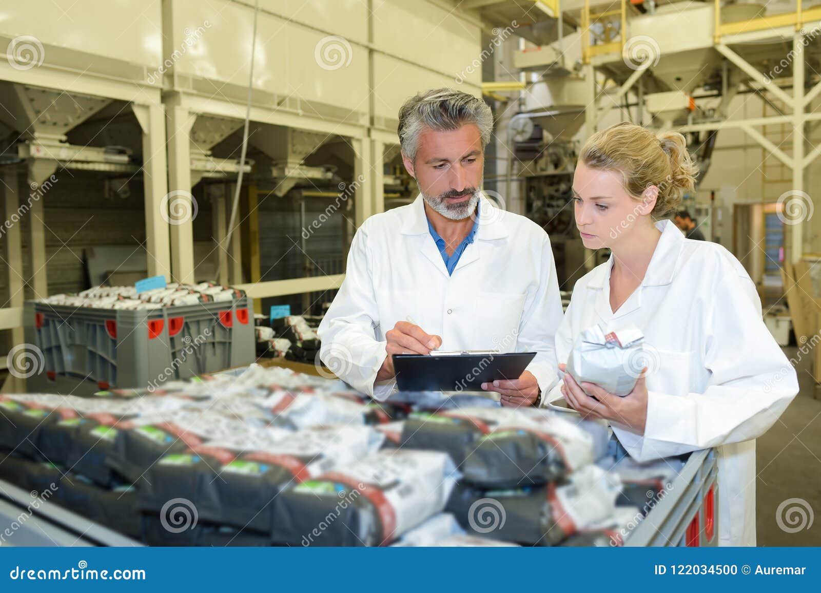 Quality Control Checking Packaged Product Stock Photo - Image of worker ...