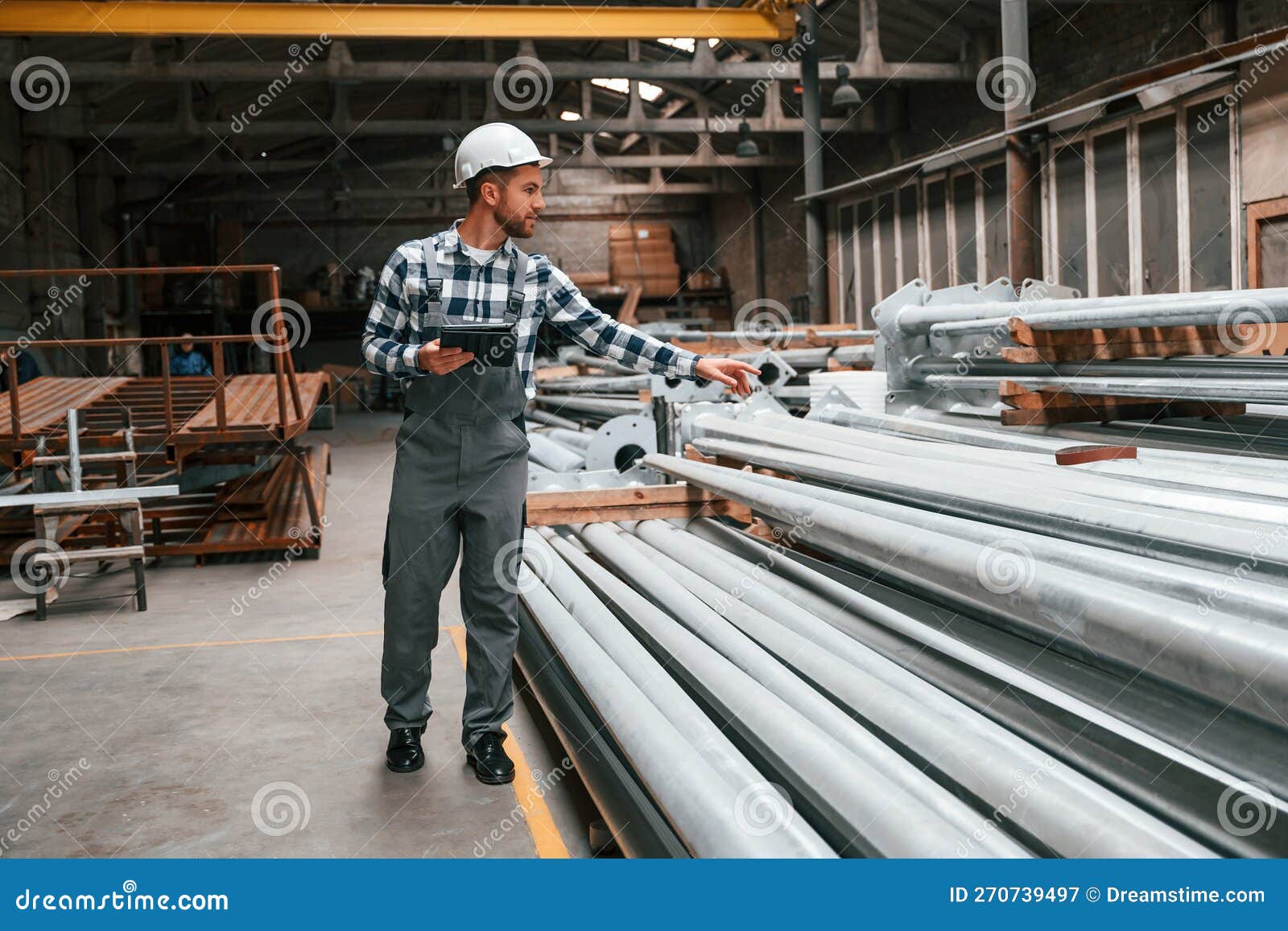 Quality Control. Factory Male Worker in Uniform is Indoors Stock Image ...