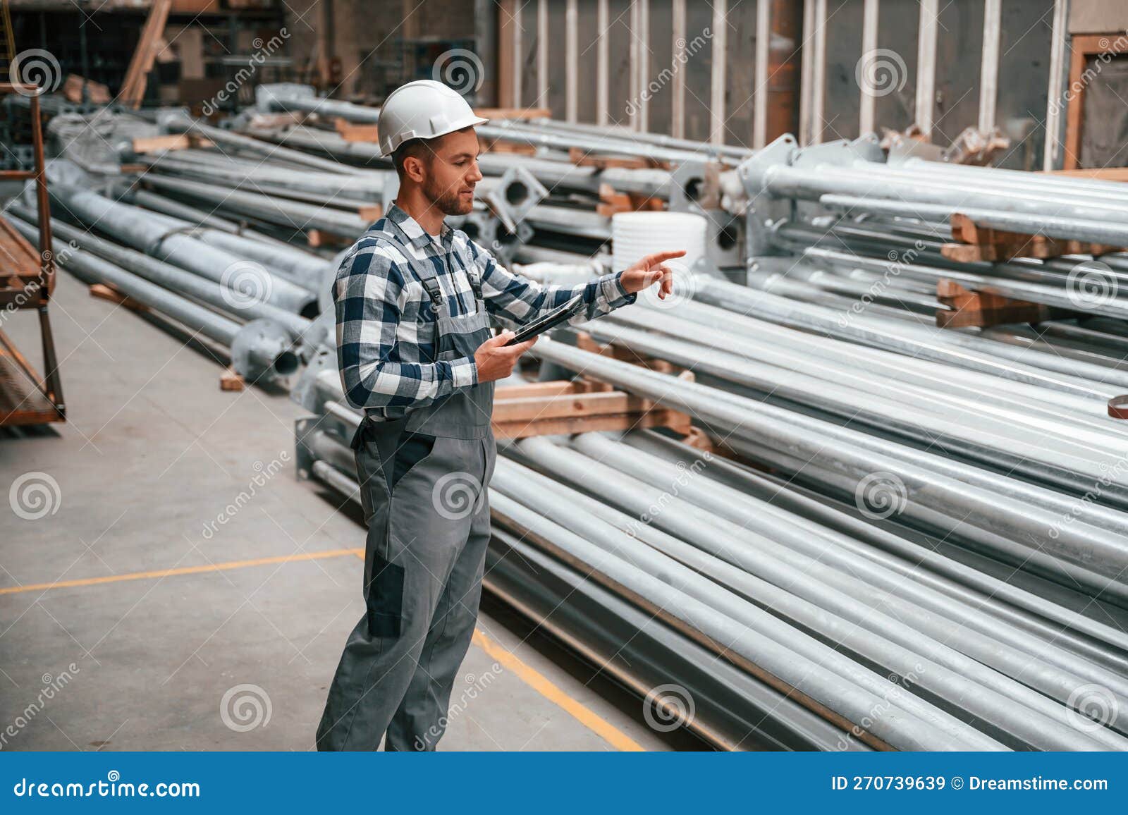 Quality Control. Factory Male Worker in Uniform is Indoors Stock Image ...