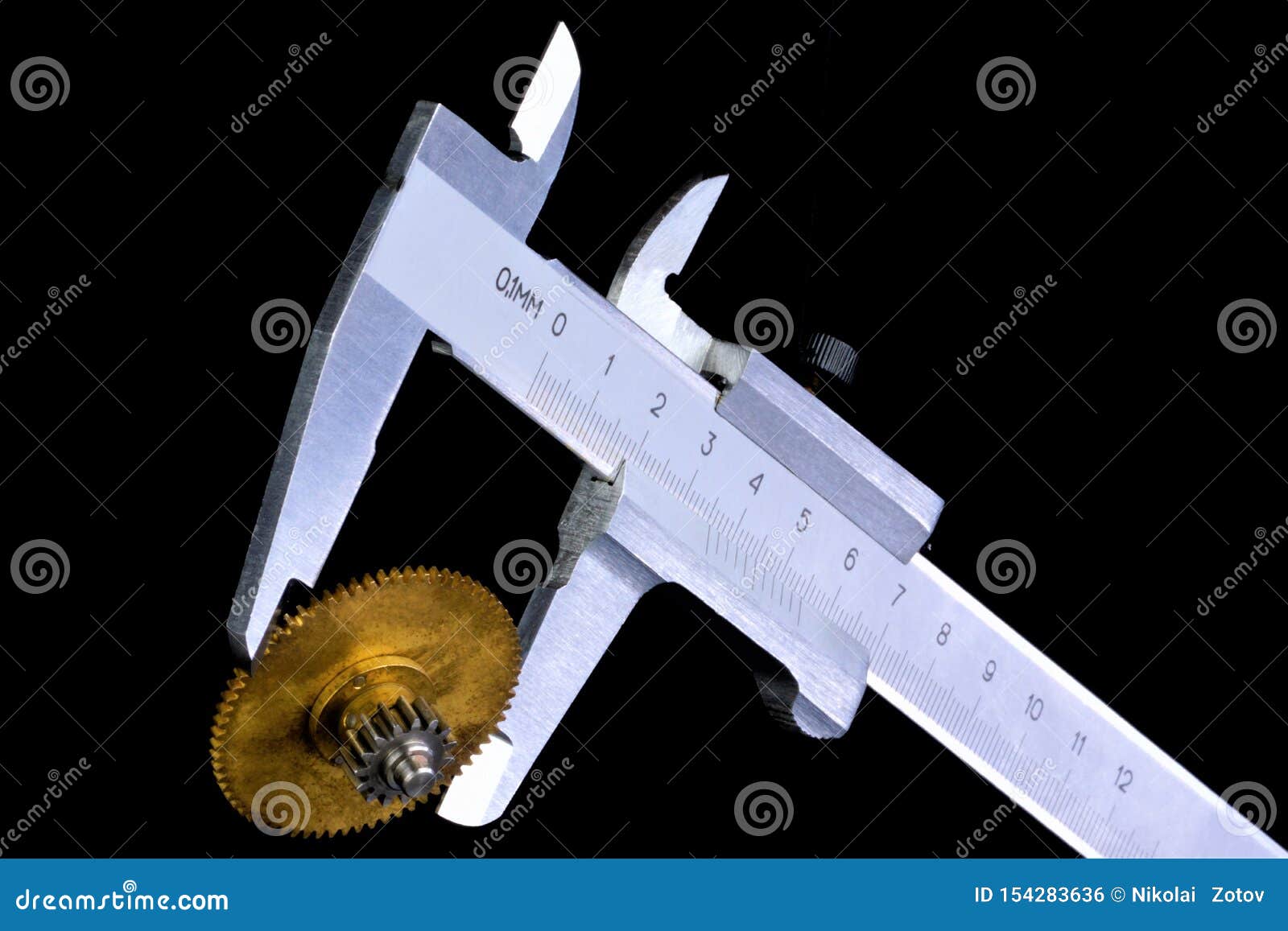 Quality Control Measuring the Size of a Caliper-toothed Wheel. Control ...