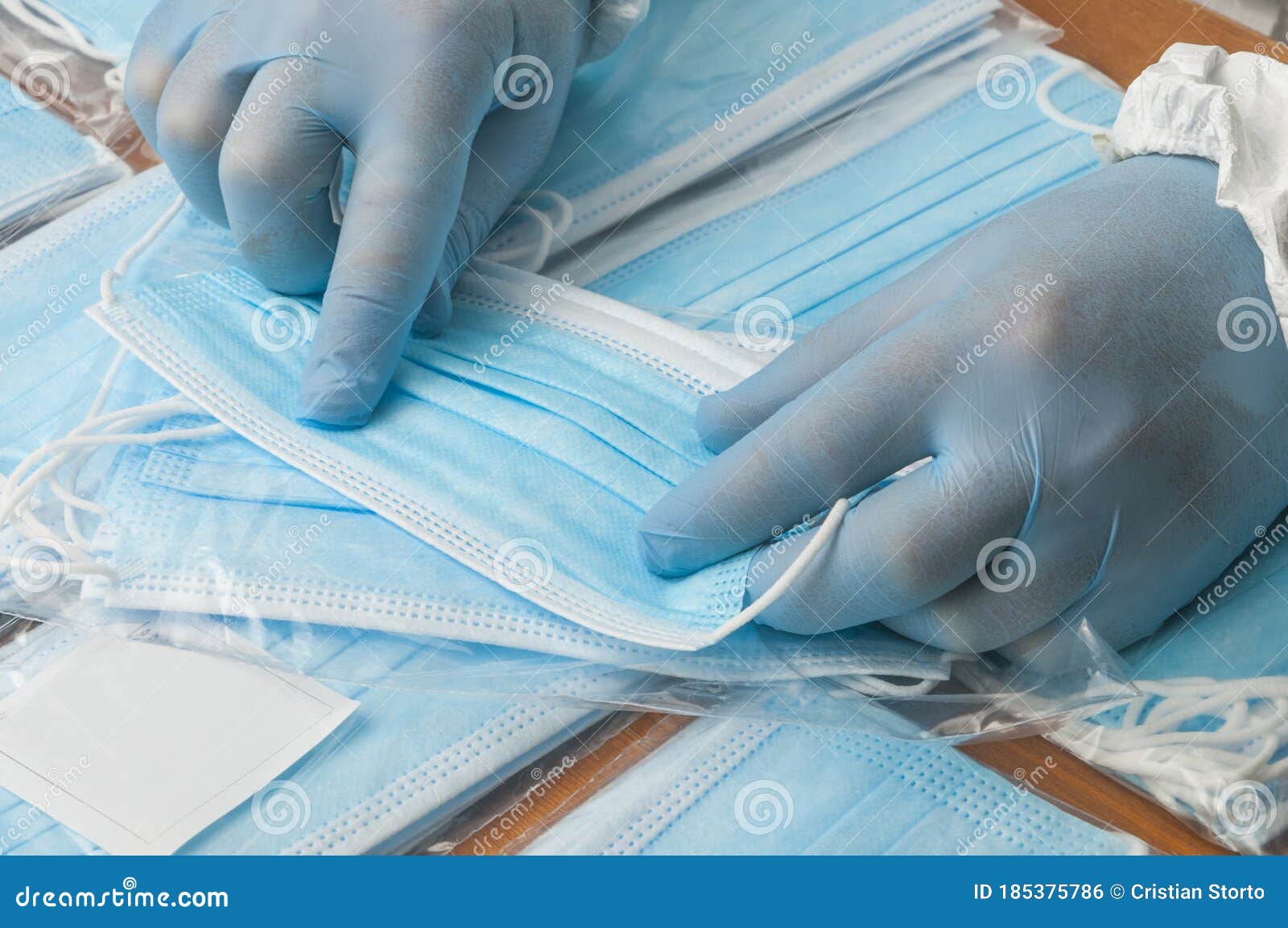 Quality Control Operator with Gloves and Protective Suit, Checks the ...