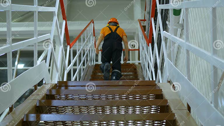 Quality Control Operator Inspects Factory Installations during Night ...