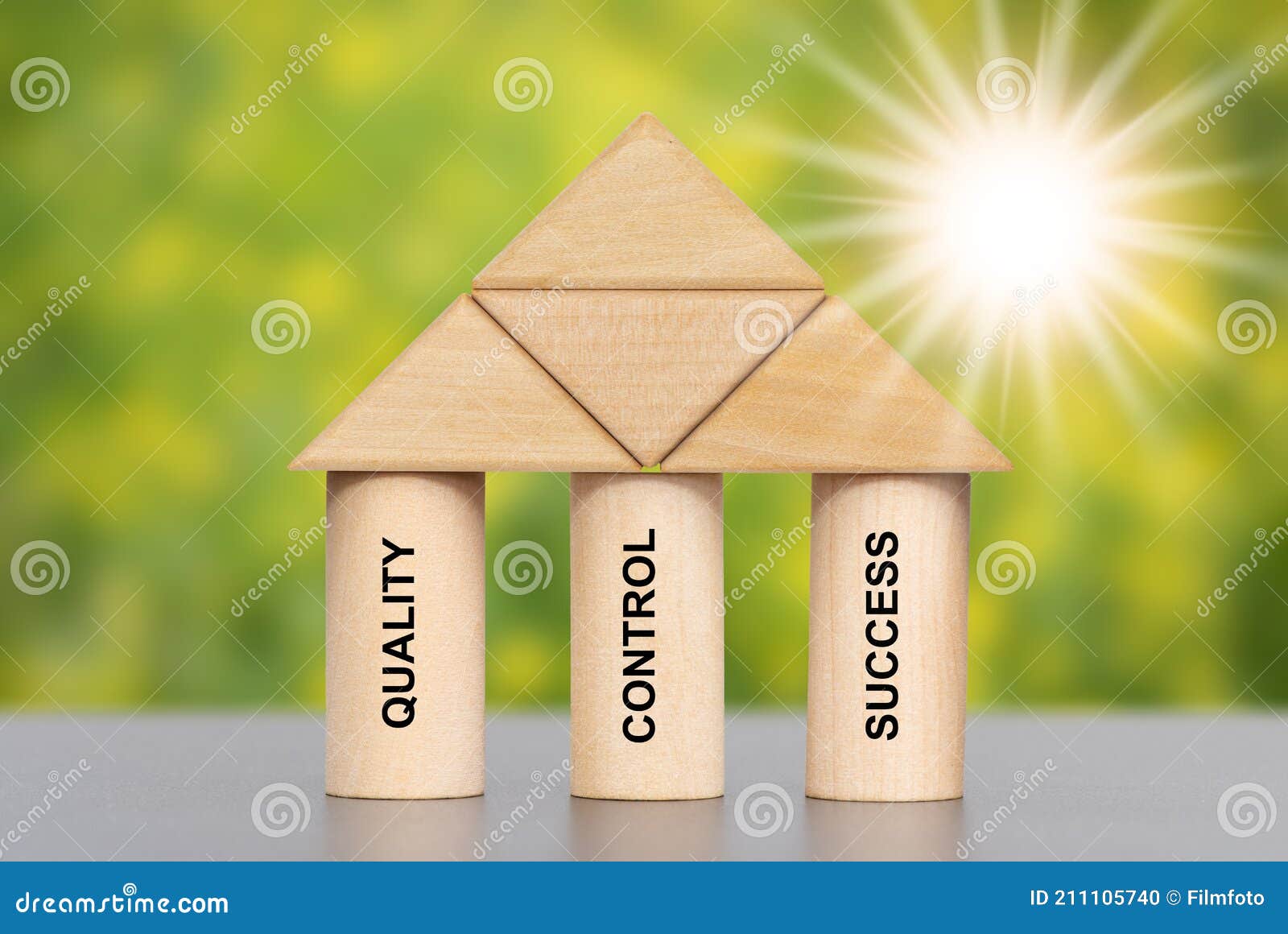 Quality, Control and Success Printed on Three Pillars Stock Photo ...