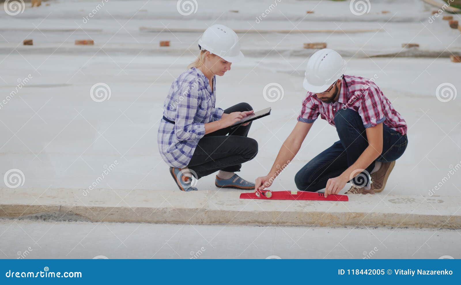 The Quality Control Inspector Checks the Accuracy of Building ...