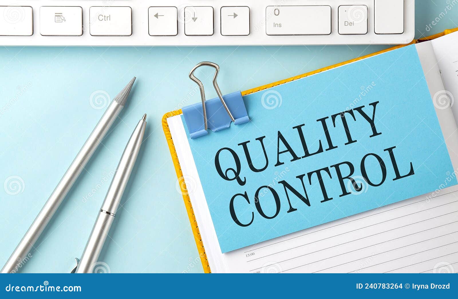 QUALITY CONTROL Text on Sticker on the Blue Background with Pen and ...