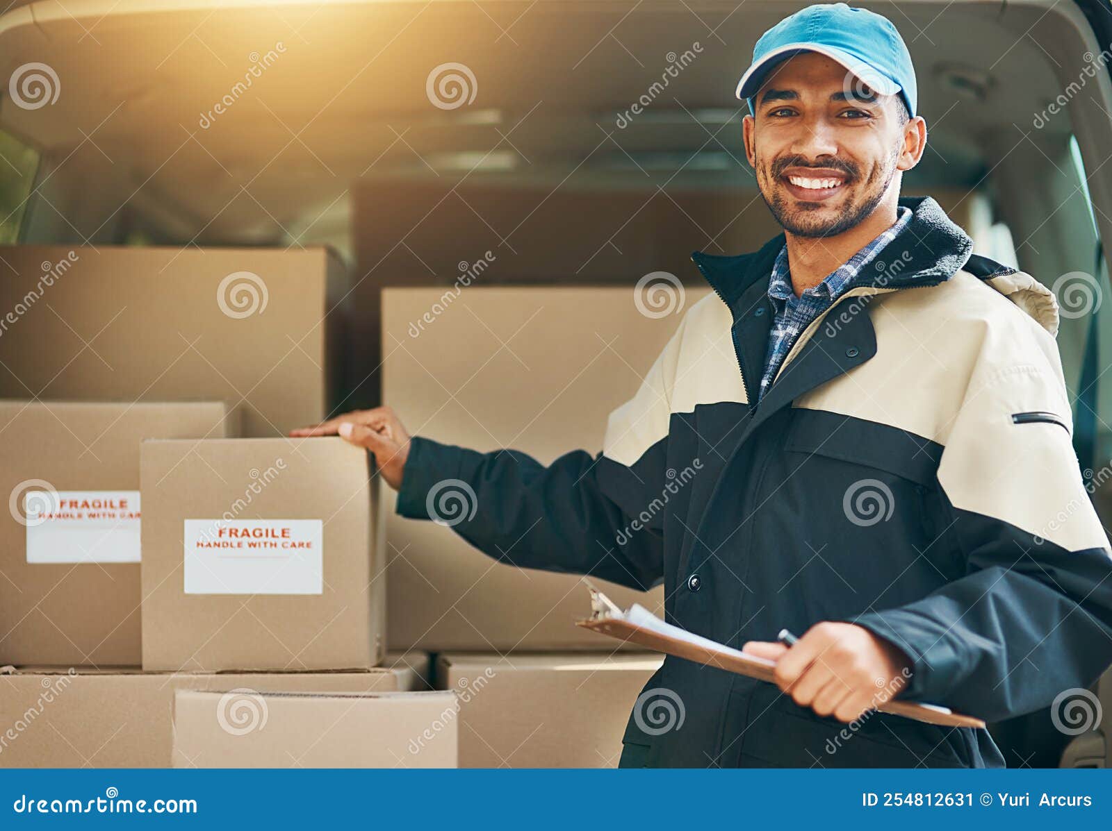 Quality Control is of Utmost Importance. Portrait of a Courier Checking ...