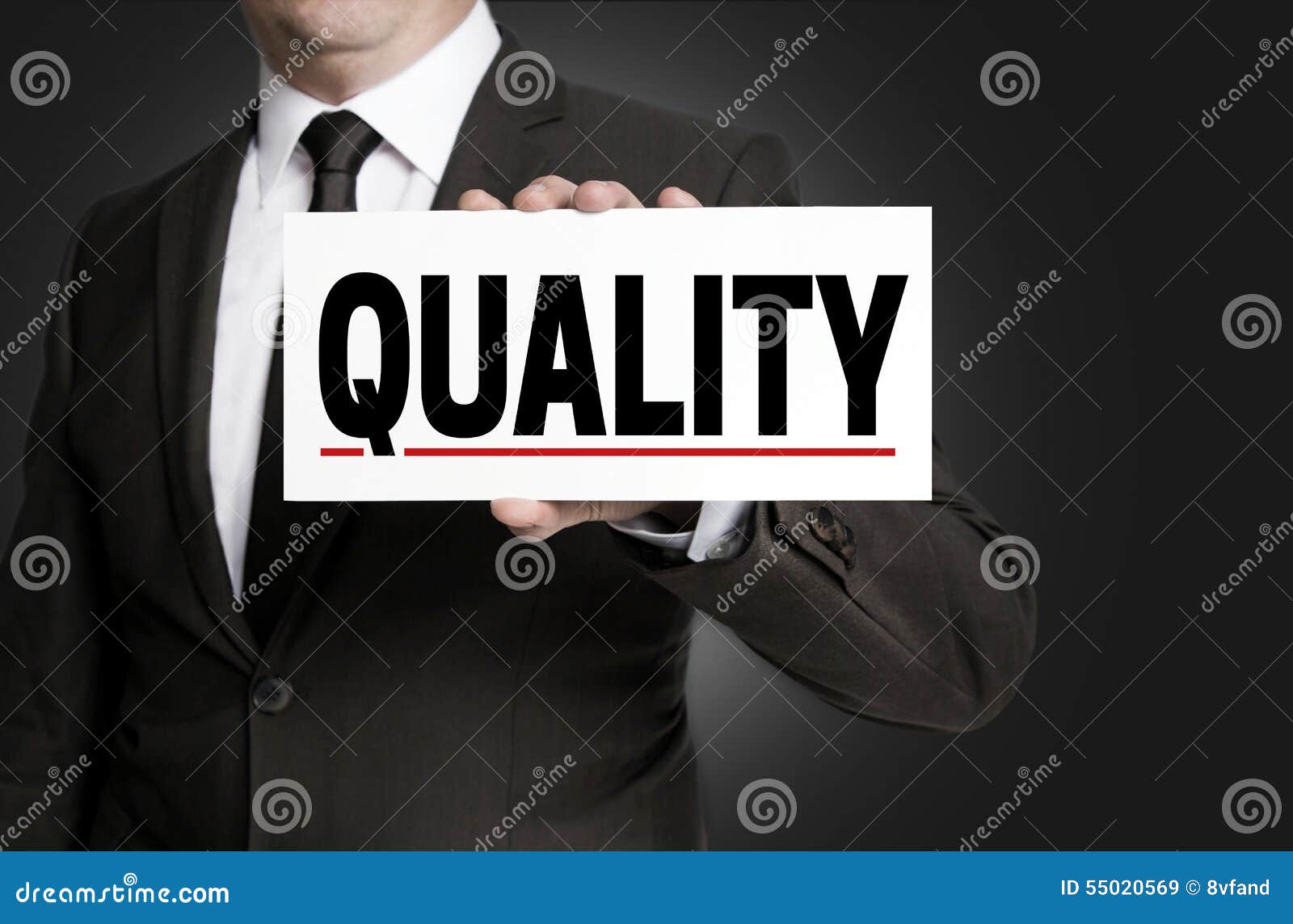 Quality Sign is Held by Businessman Stock Image - Image of label ...