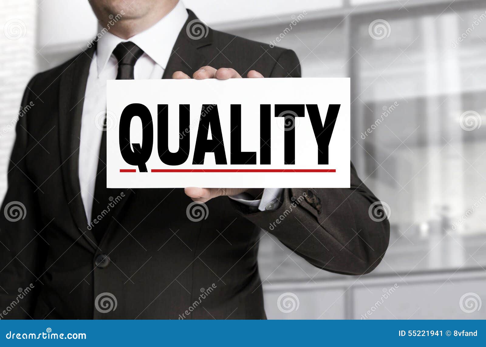 Quality Sign is Held by Businessman Stock Image - Image of sign, space ...