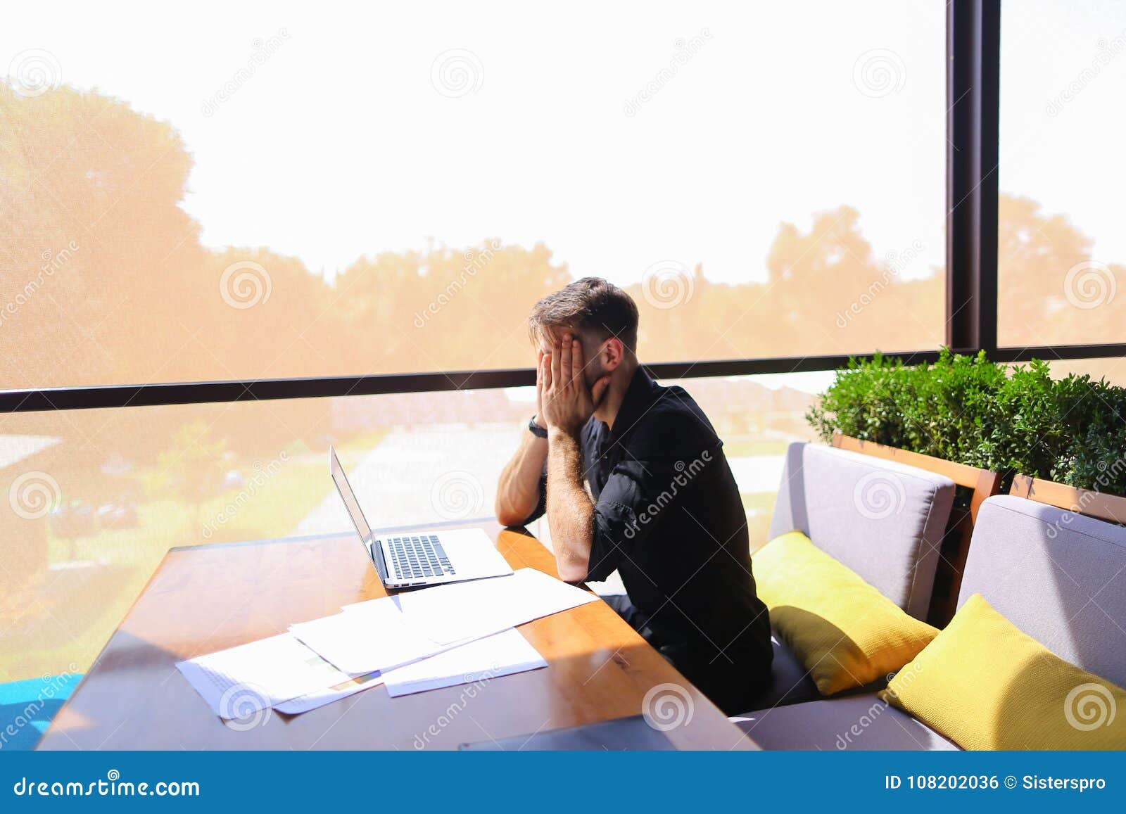 Quantity Surveyor Working at Cafe Table with Papers and Laptop. Stock ...