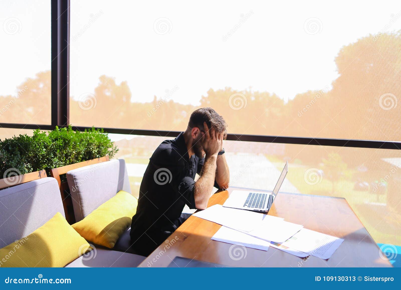 Quantity Surveyor Working at Cafe Table with Papers and Laptop. Stock ...