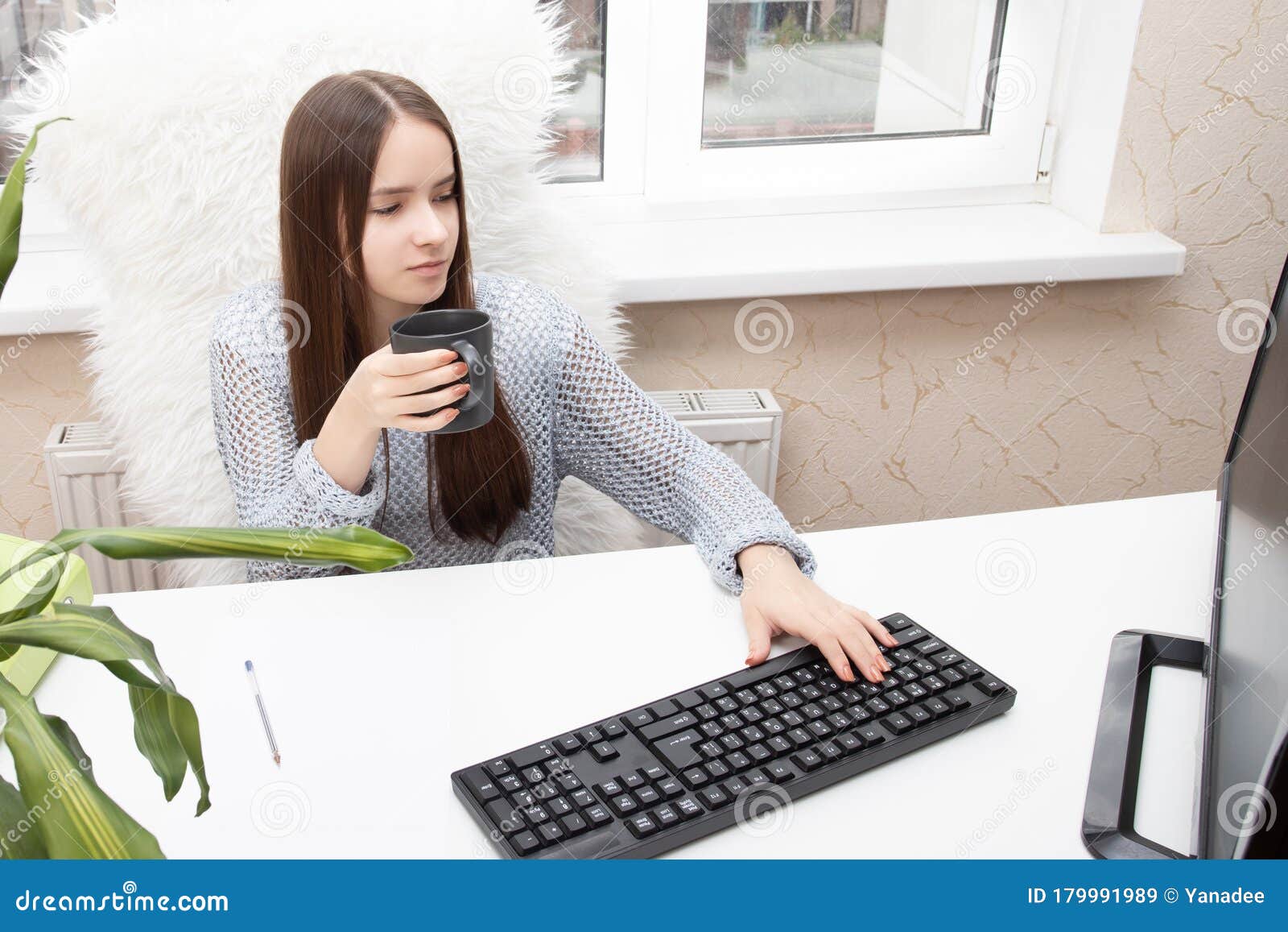 Quarantine, Isolation and Remote Work at Home are Safe. Young Girl Sits ...