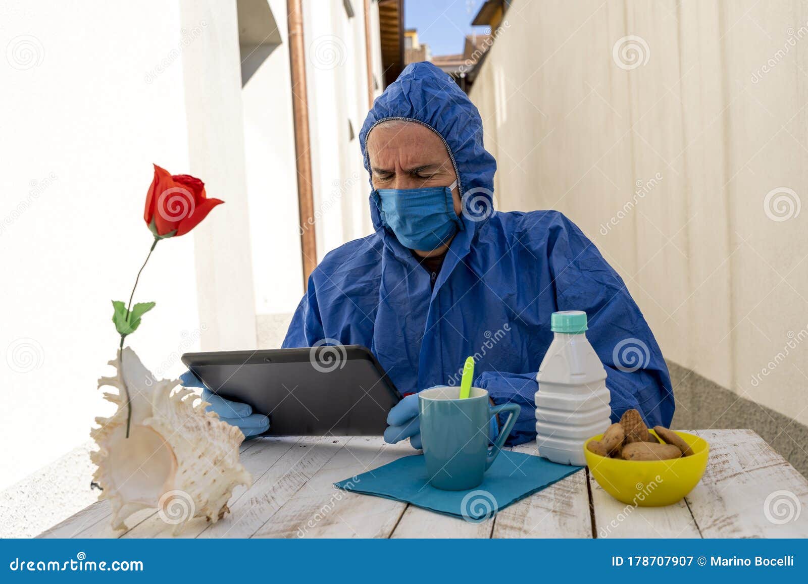 Quarantined Single Man Dressed in Protective Suit Have a Breakfast ...