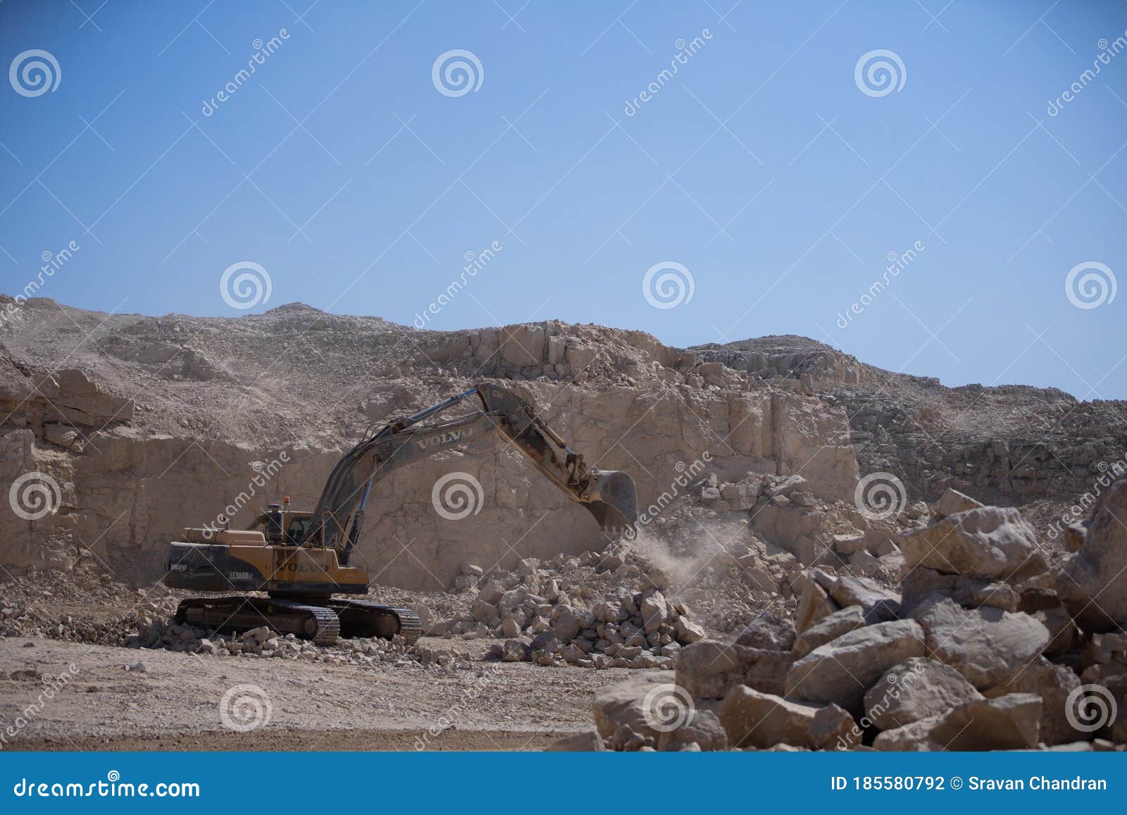 Quarry Mining Excavators Working on Breaking the Rocks Editorial ...