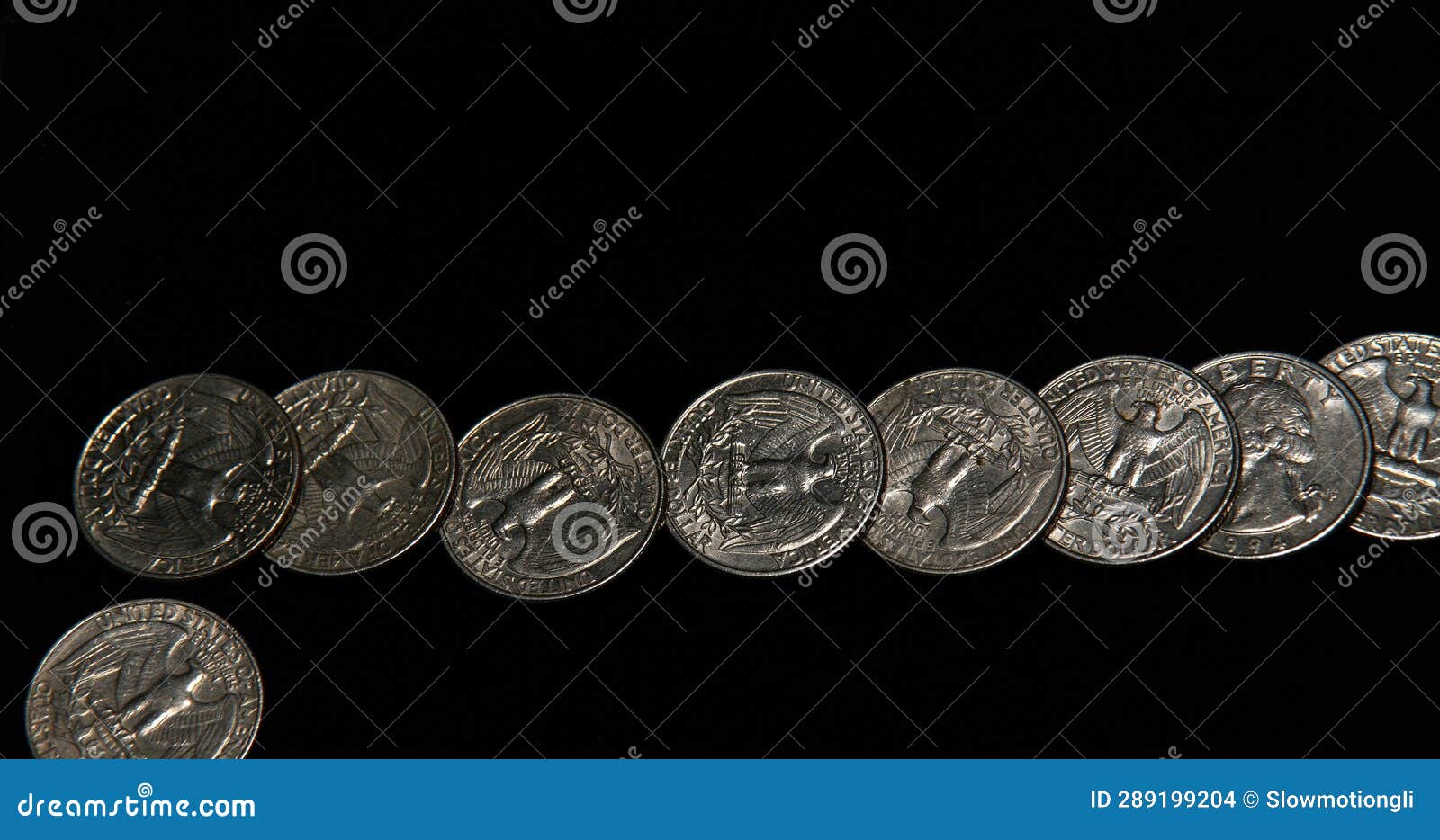 Quarter Dollar Coins Falling, Rolling and Sliding on Black Background ...